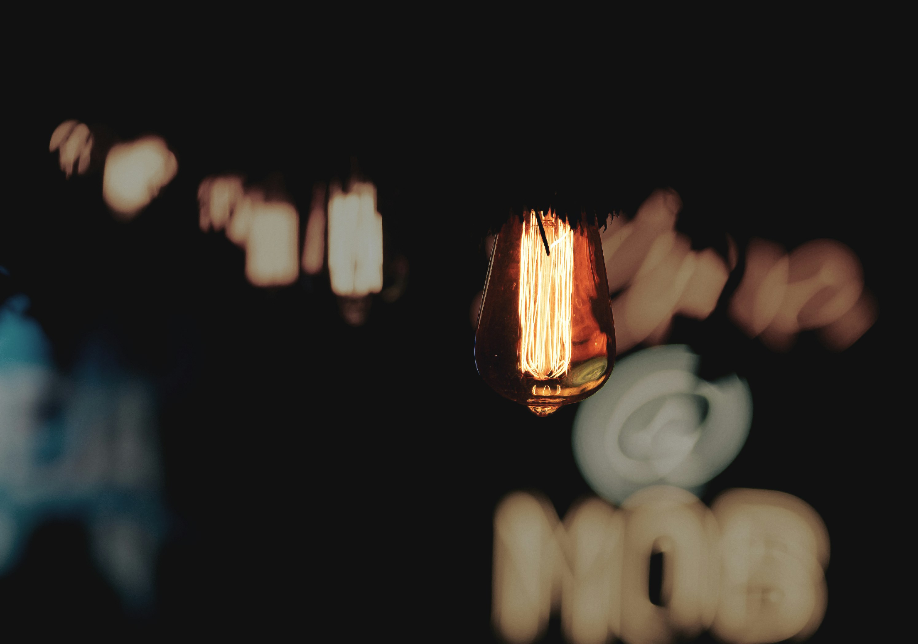 A close up of a light bulb in the dark photo – Free Ambience Image on ...