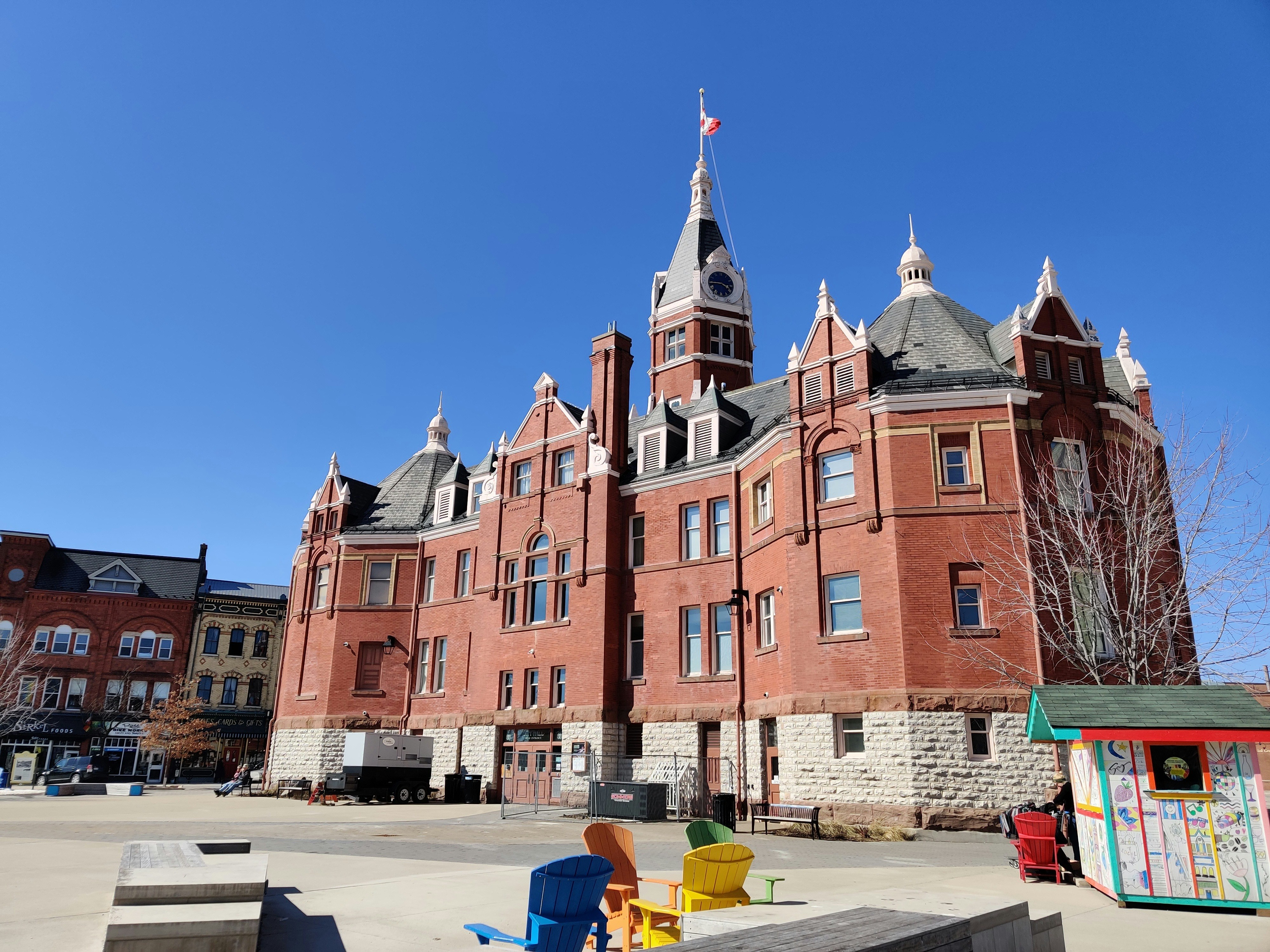 A large red brick building with a clock tower photo – Free Stratford ...