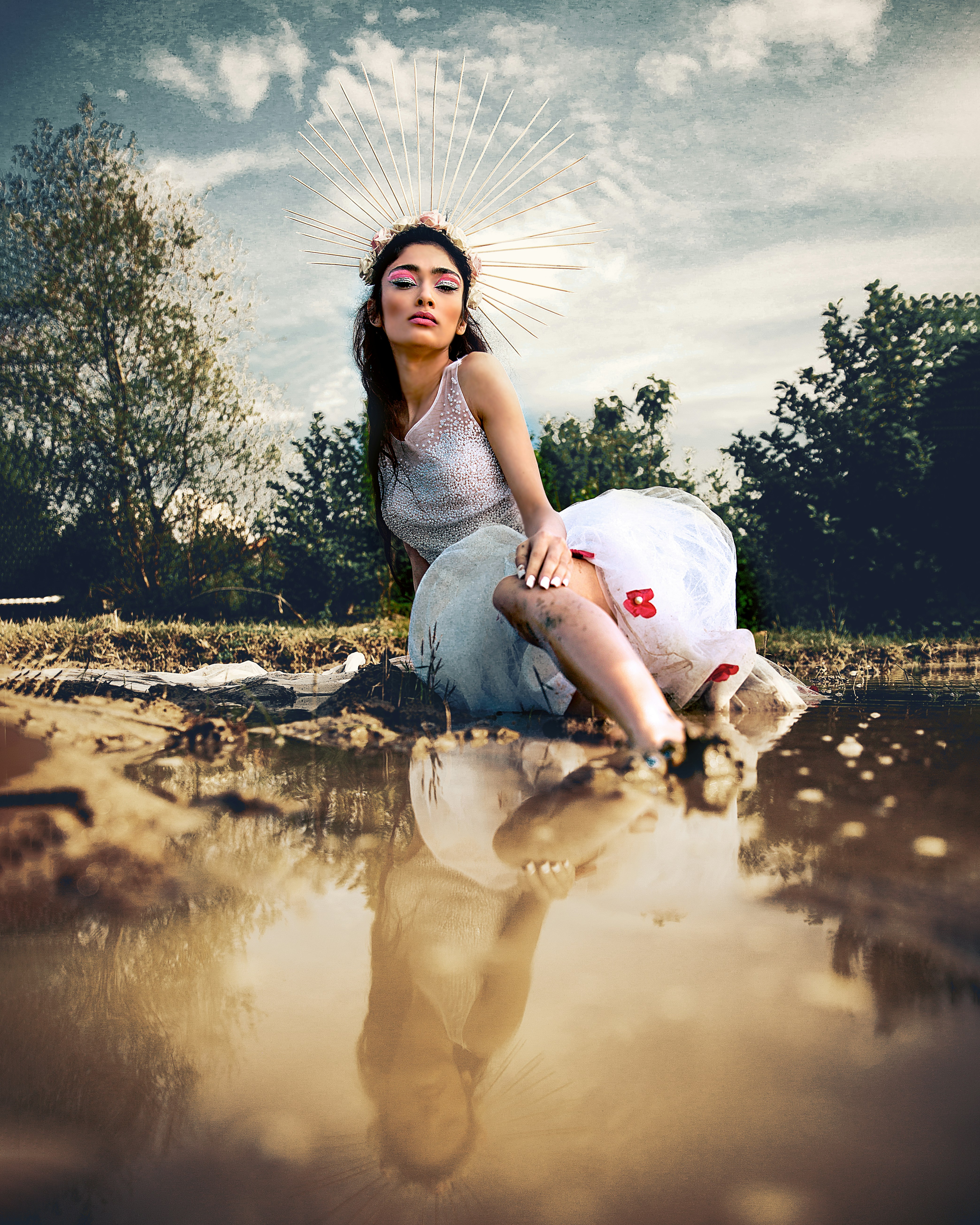 Haloed in Water: Portrait of Confidence by the Riverside