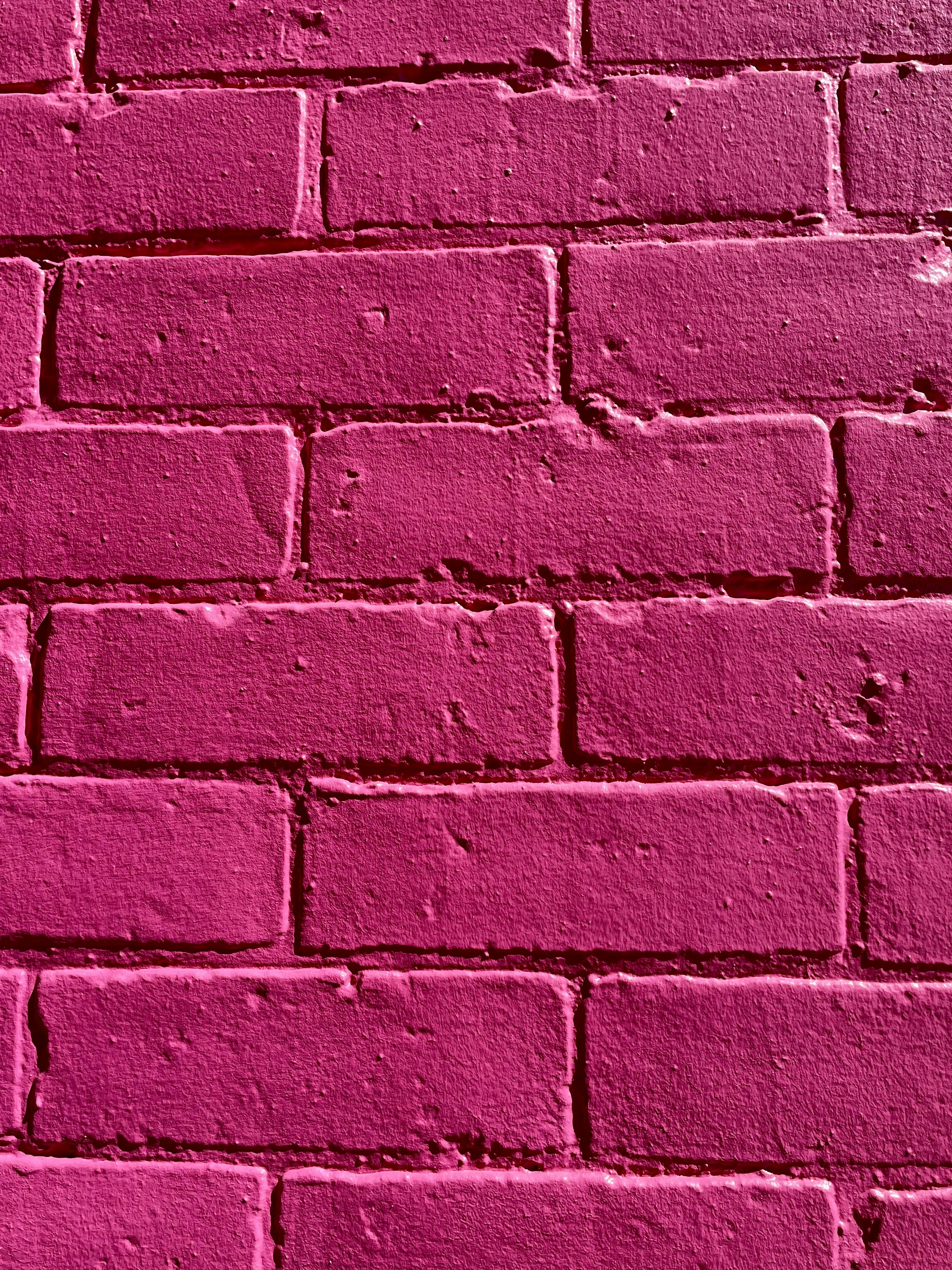 Dark pink brick wall