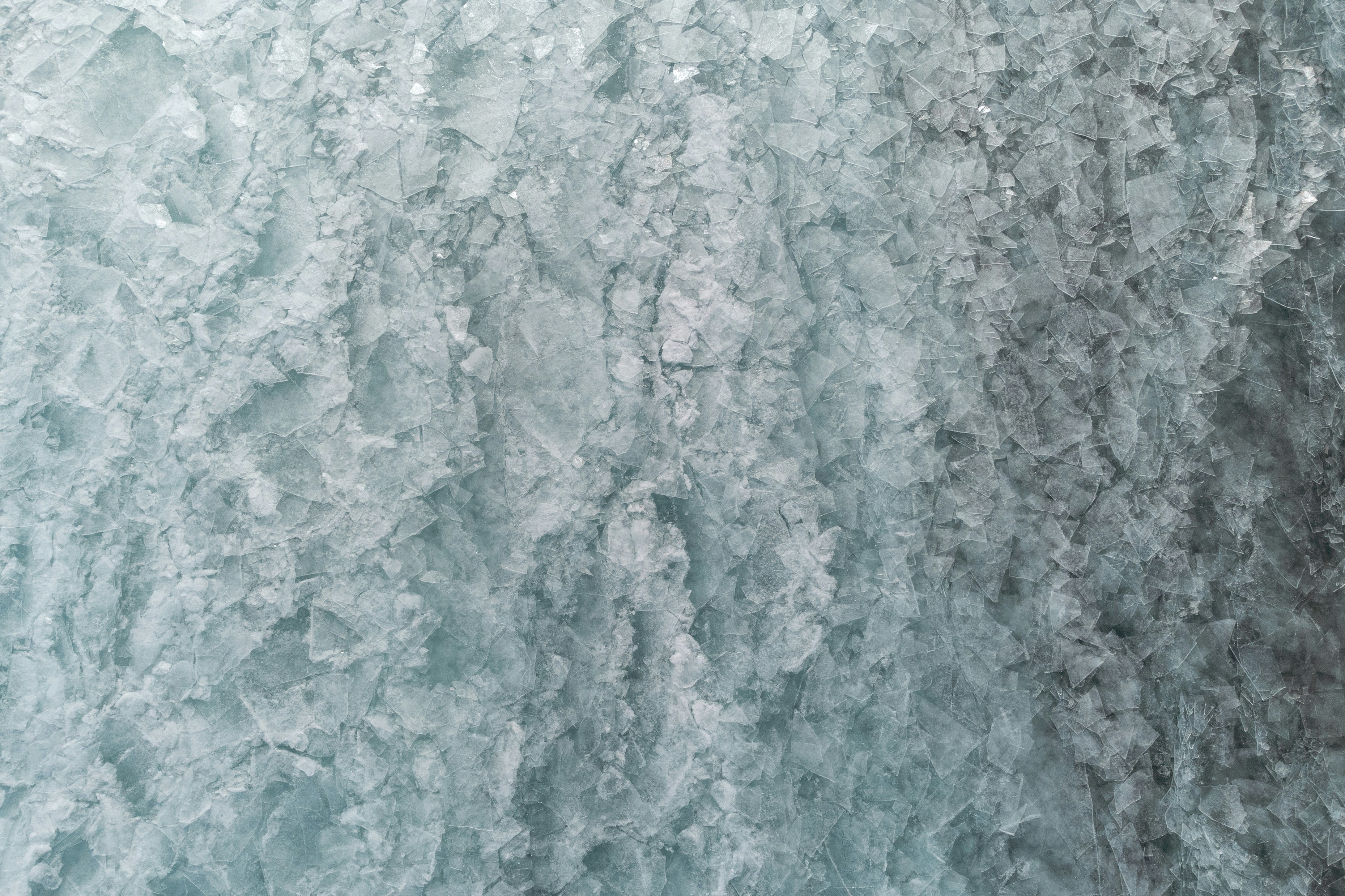 A close up view of ice on the side of a mountain photo – Free Ice Image ...