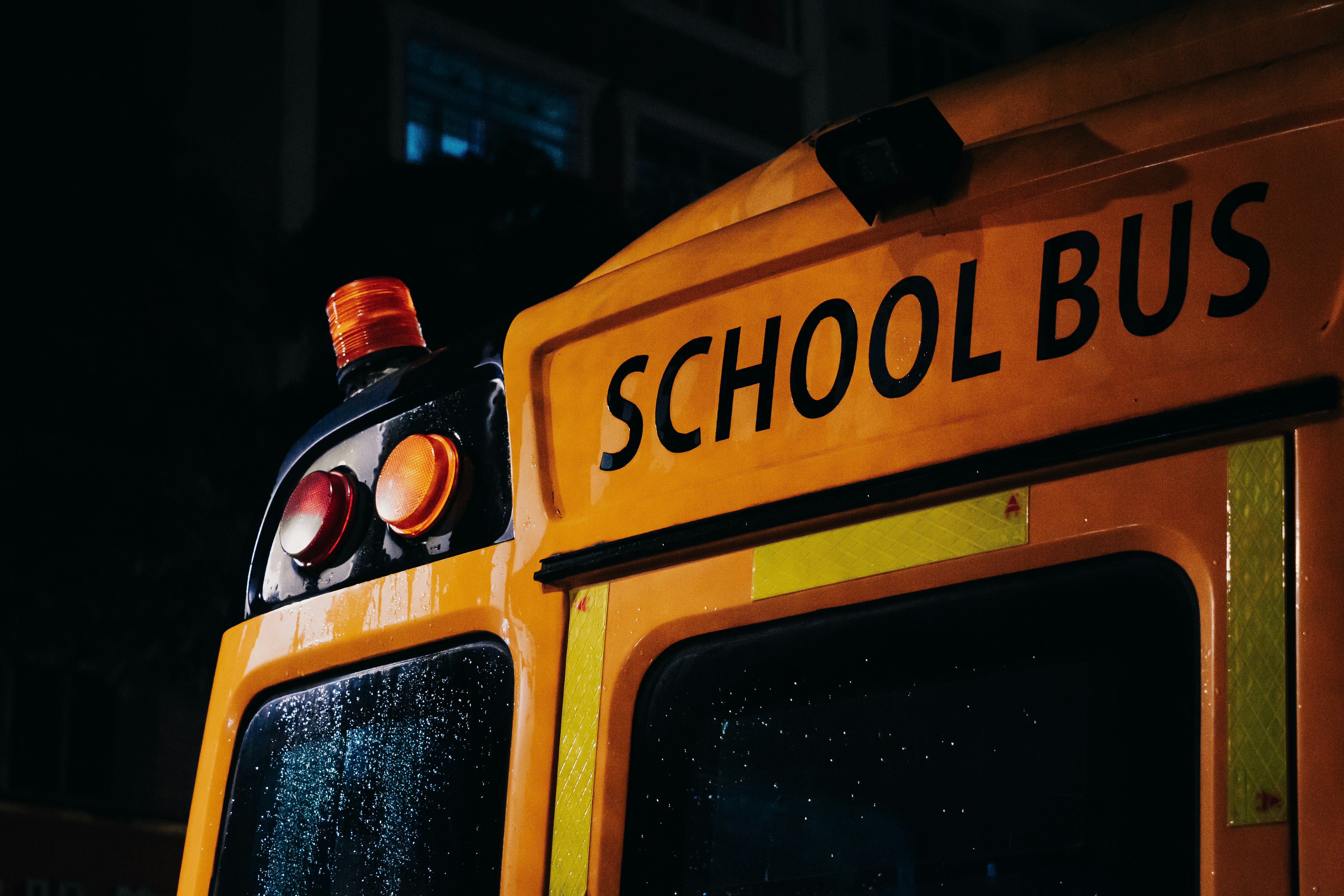A close up of a school bus at night photo – Free Bus Image on Unsplash