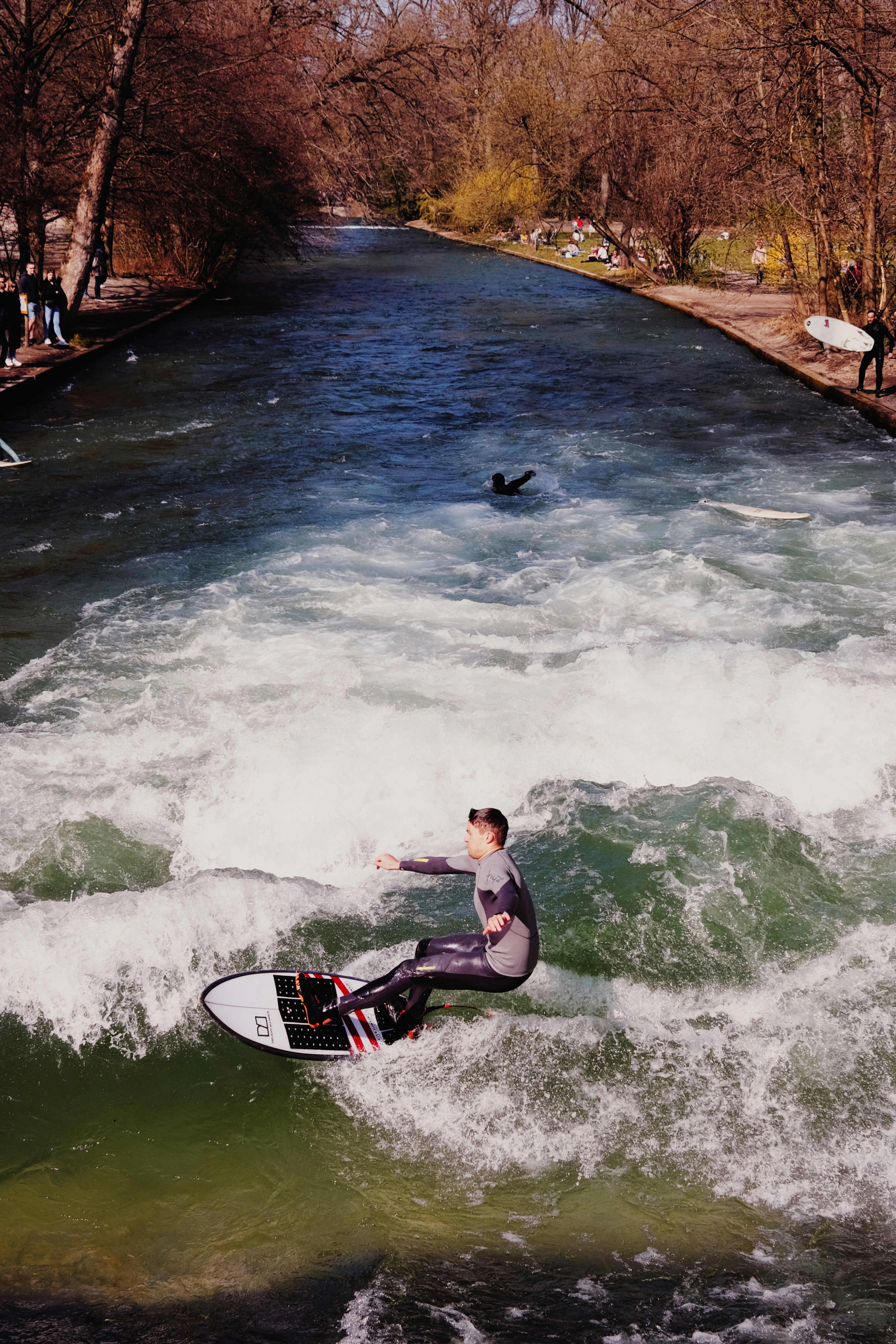 Urban Whitewater: A Solo Surfer Carves Through the Park River Crest