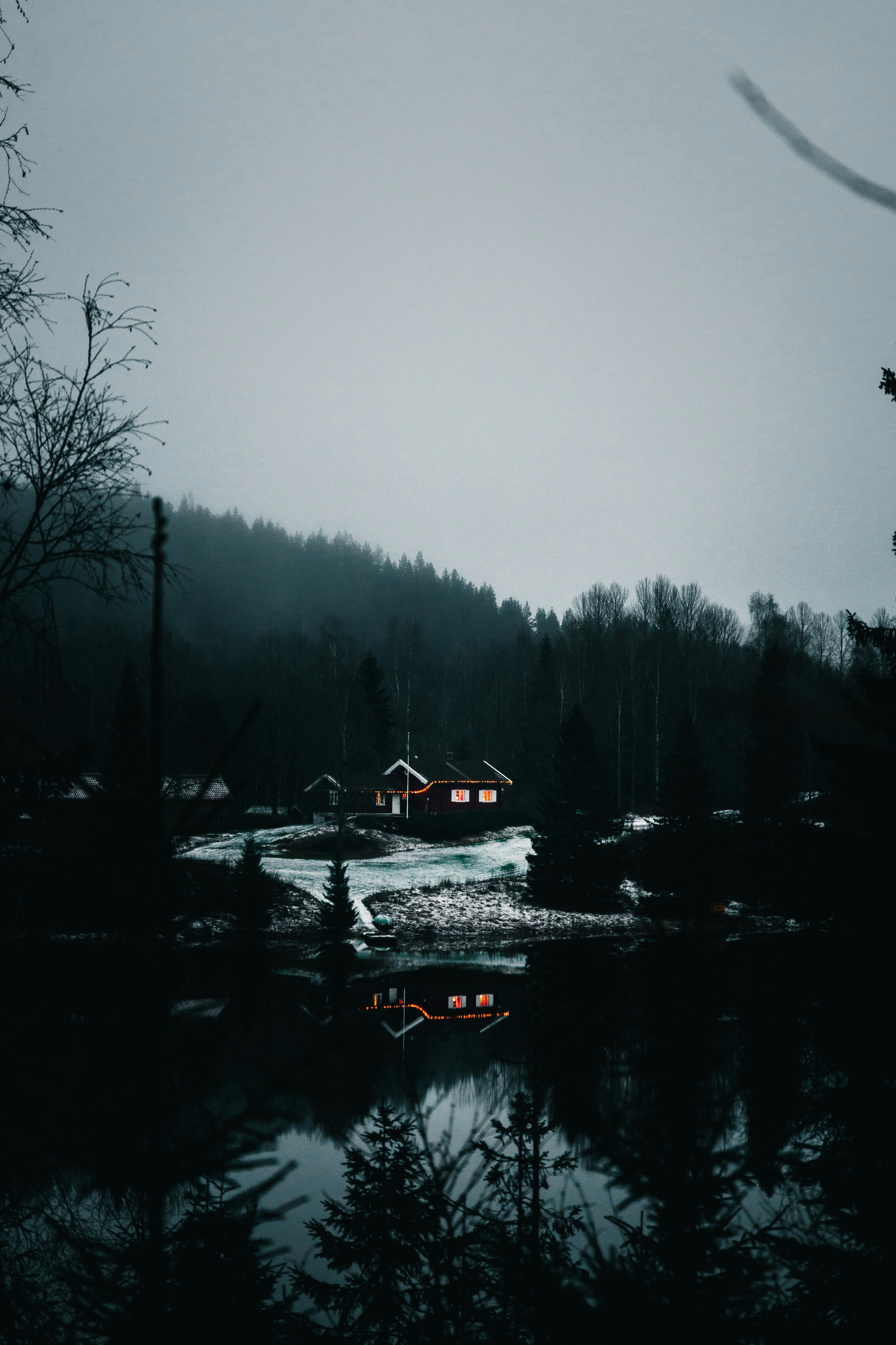 Midnight Cabin Mirror: A Snowlit Refuge by Still Water