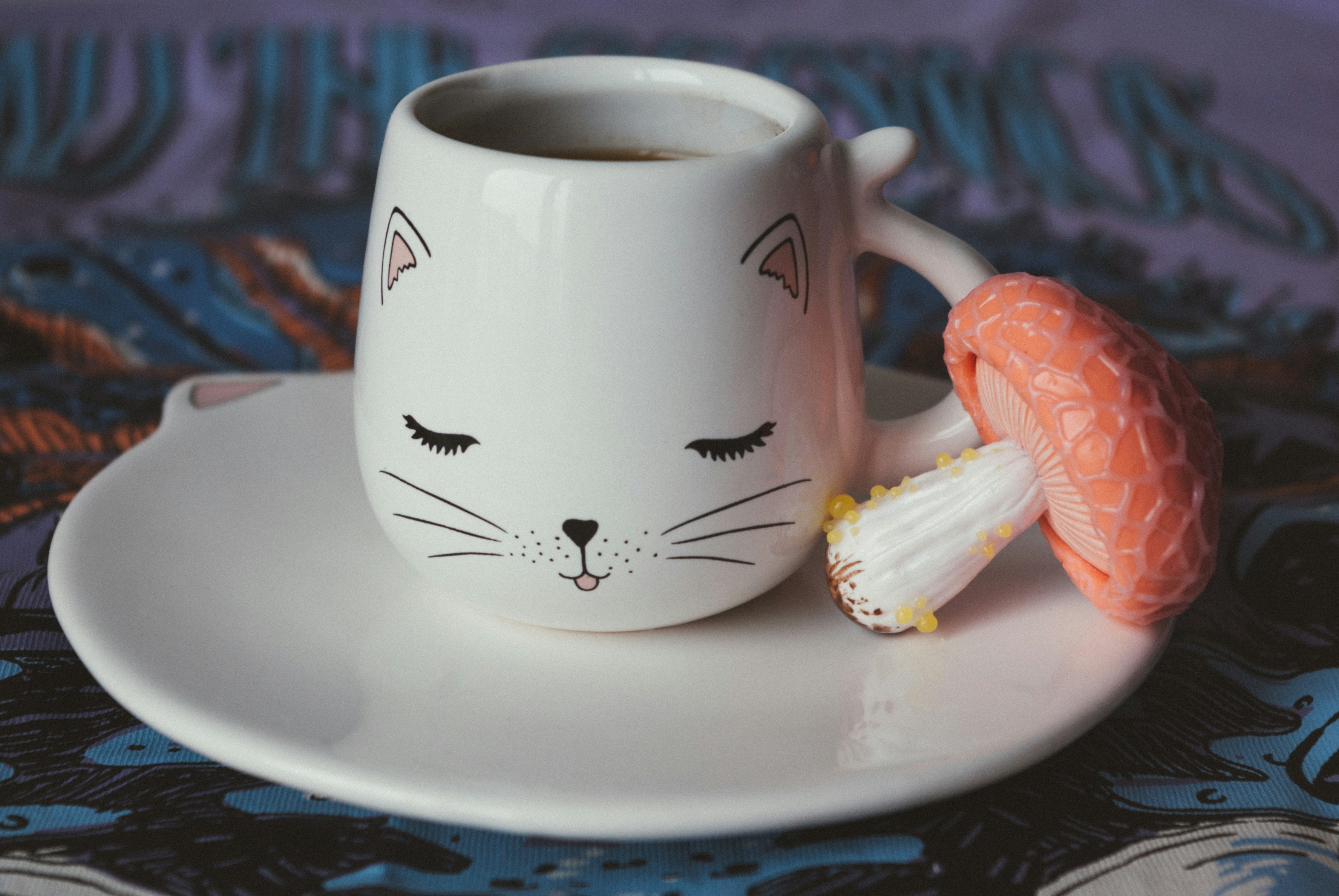 Whiskers on a White Teacup: A Quiet Moment with a Pink Mushroom
