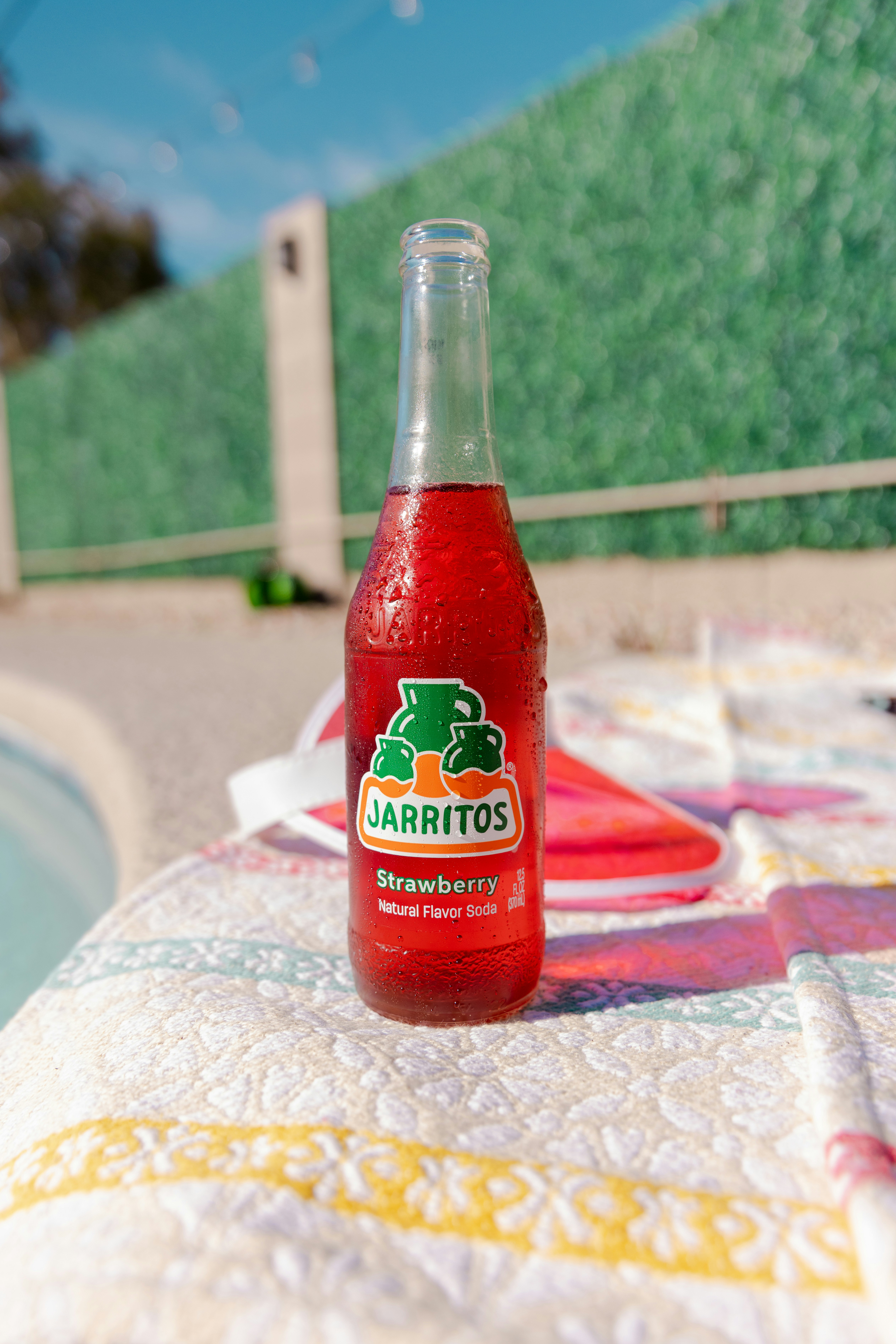 Strawberry Jarritos by the pool on vacation.