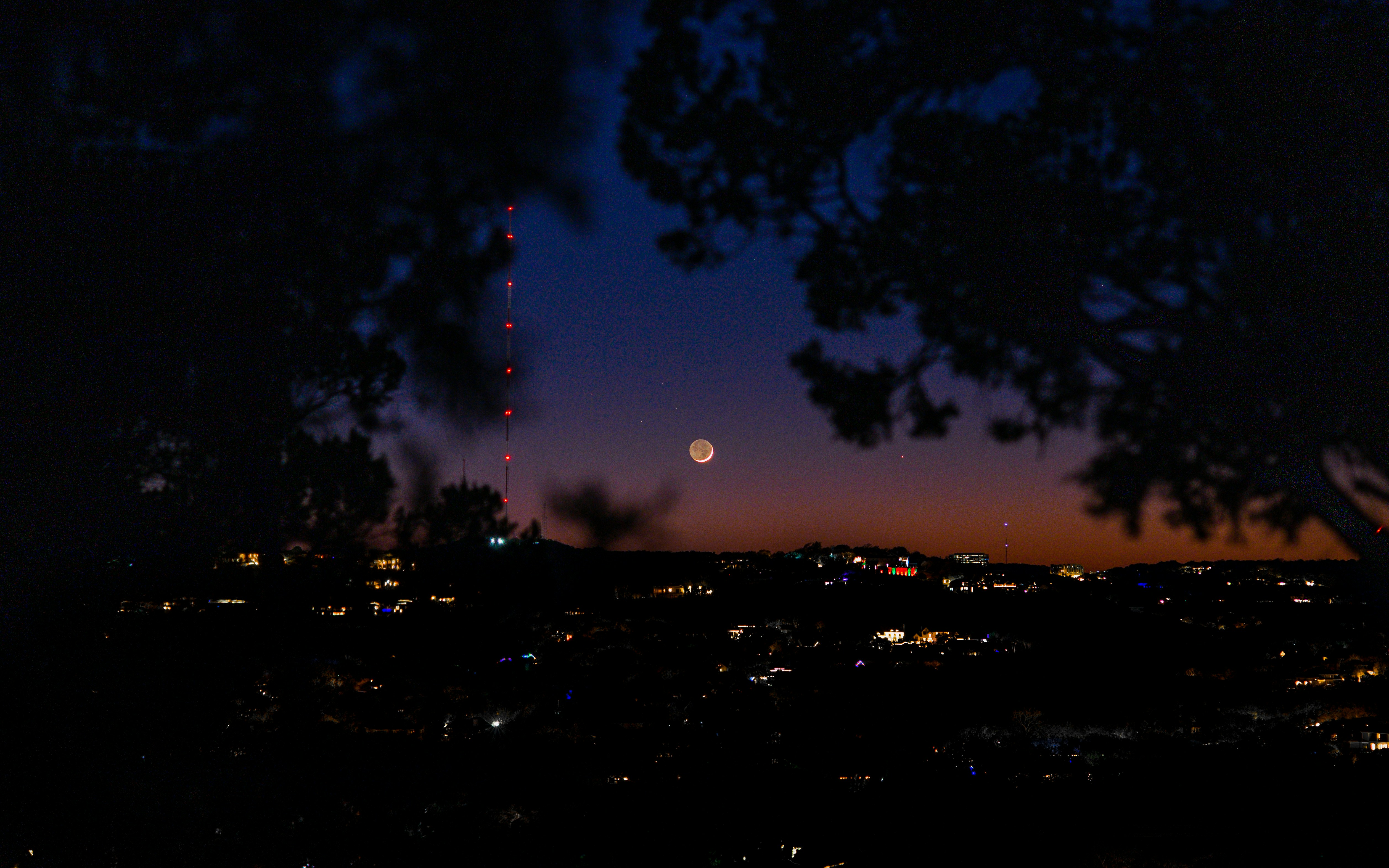 A view of a city from a hill at night photo – Free Mount bonnell Image ...