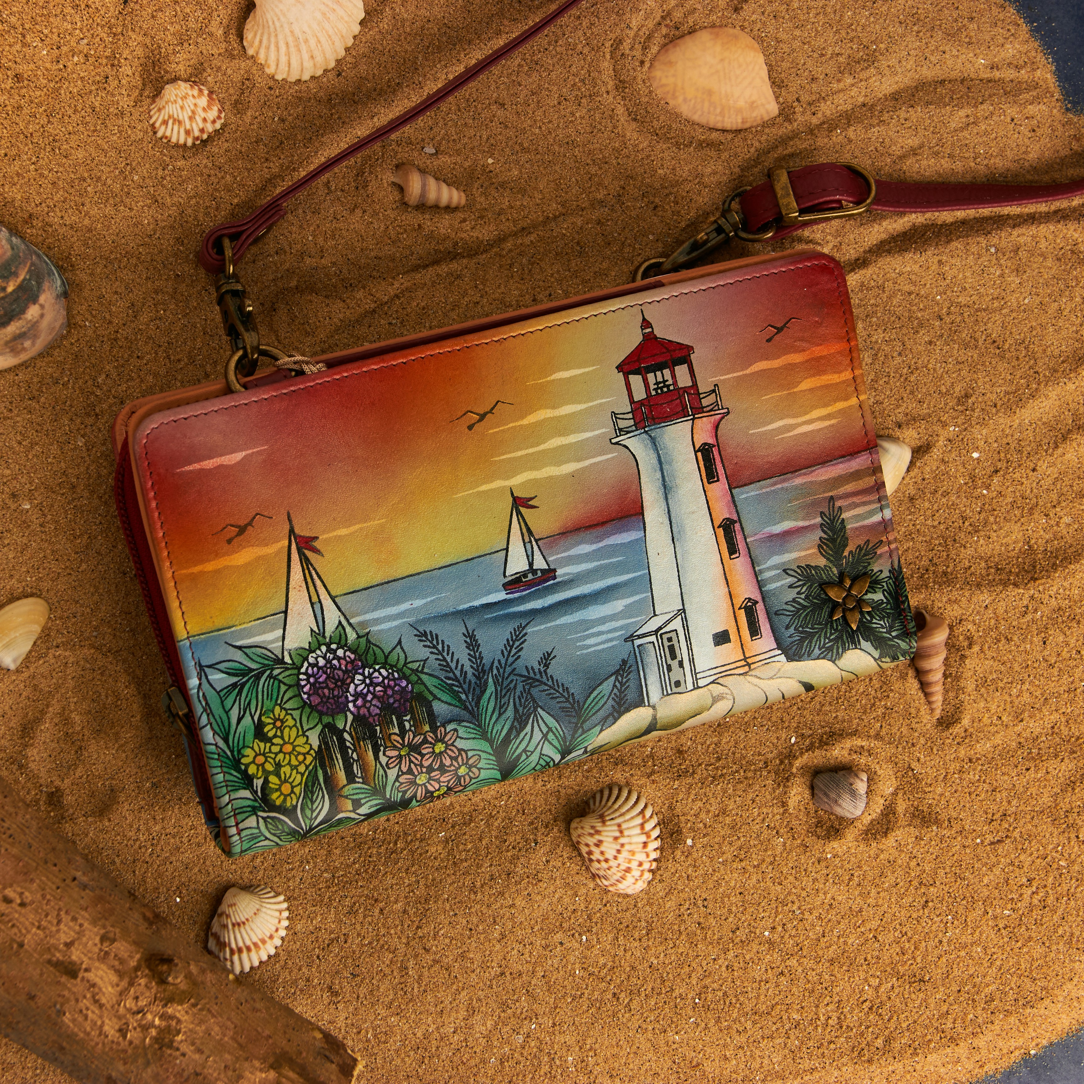Sunset Harbor Purse: A Handpainted Tote Resting on Sandy Shore