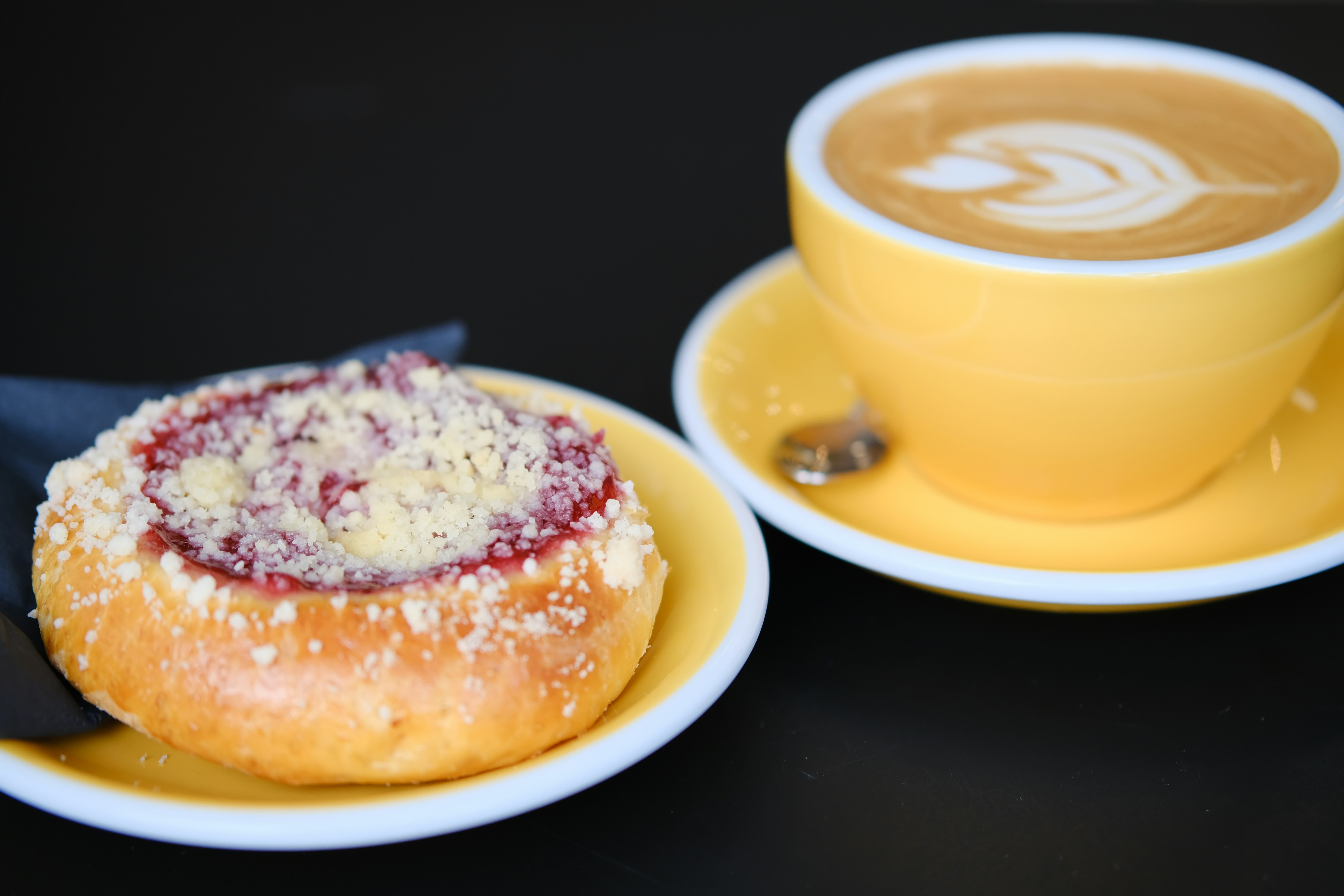 A cup of coffee with dessert