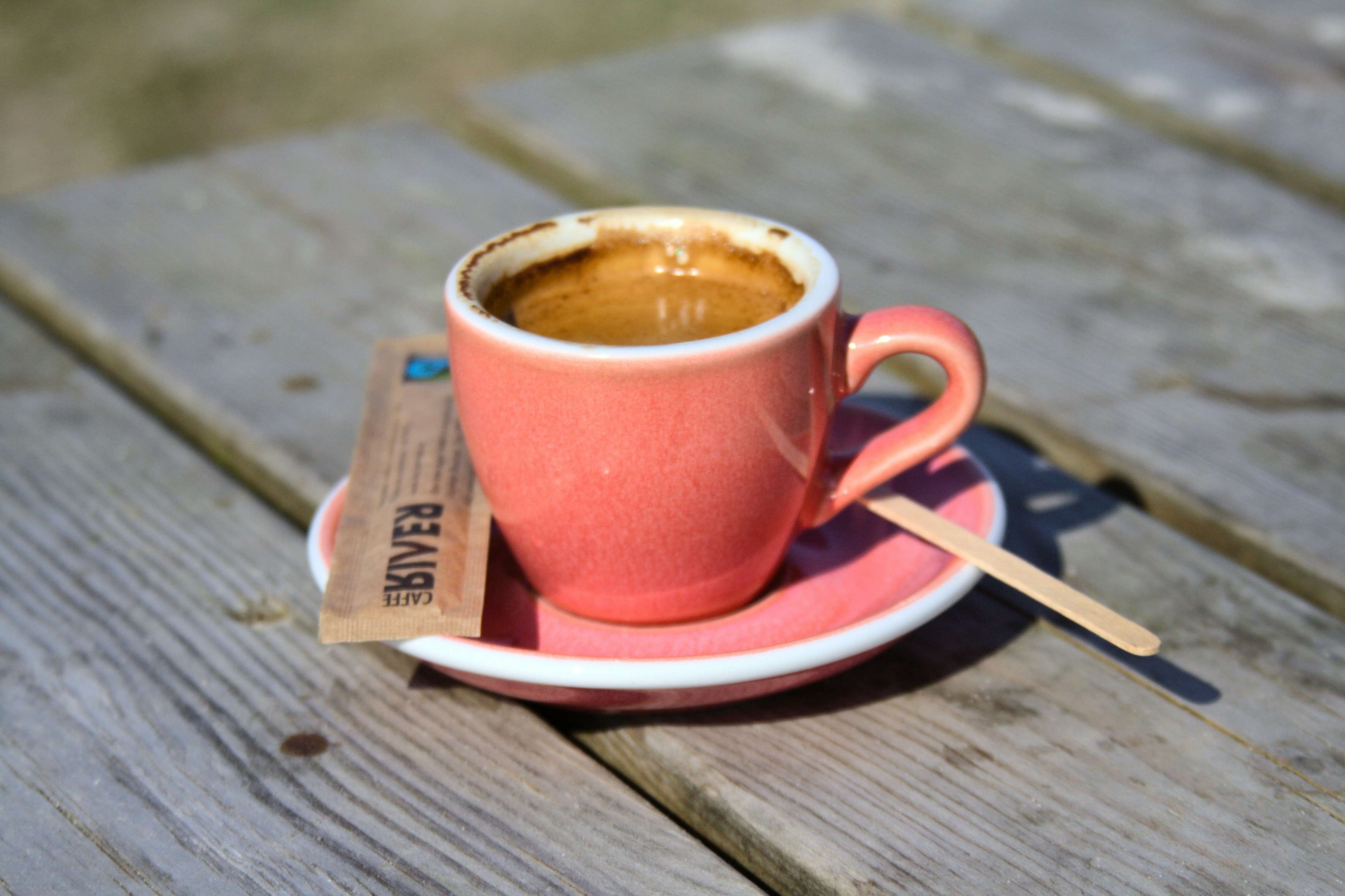 Pink Cappuccino on a Weathered Wooden Table