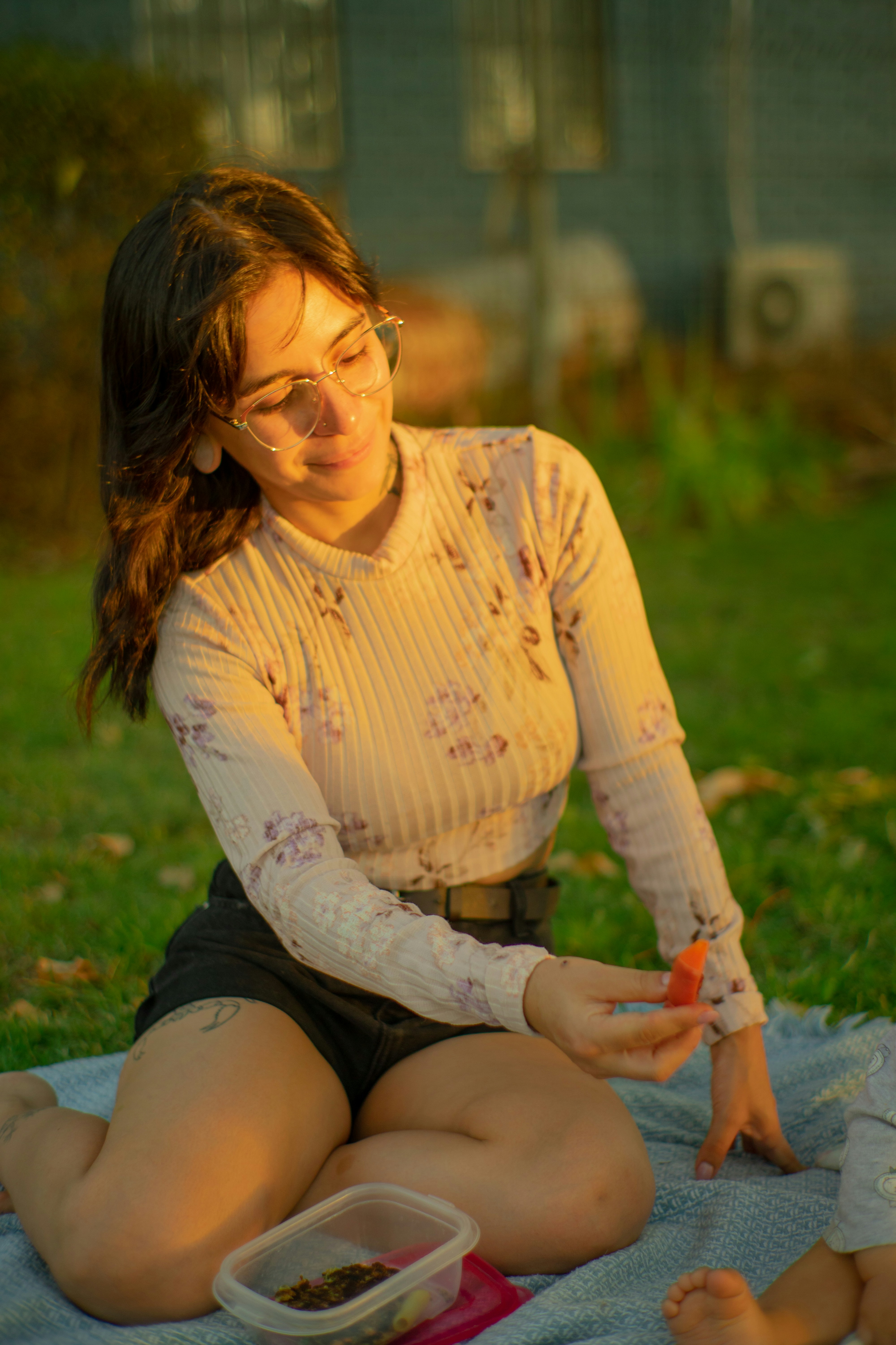 Golden Hour Connection: A Quiet Moment on a Picnic Blanket