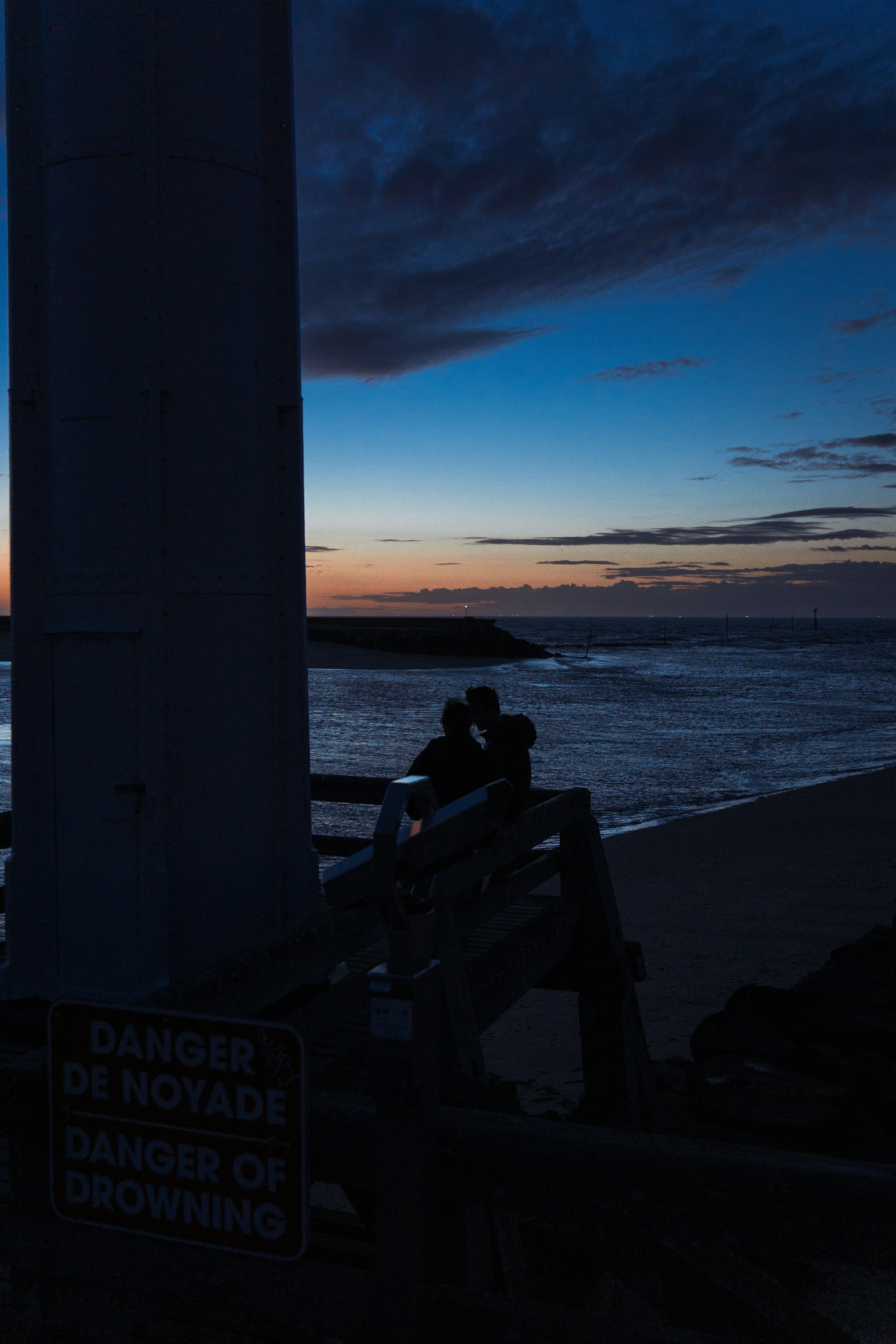 Twilight by the Pier: Lovers in the Dusk