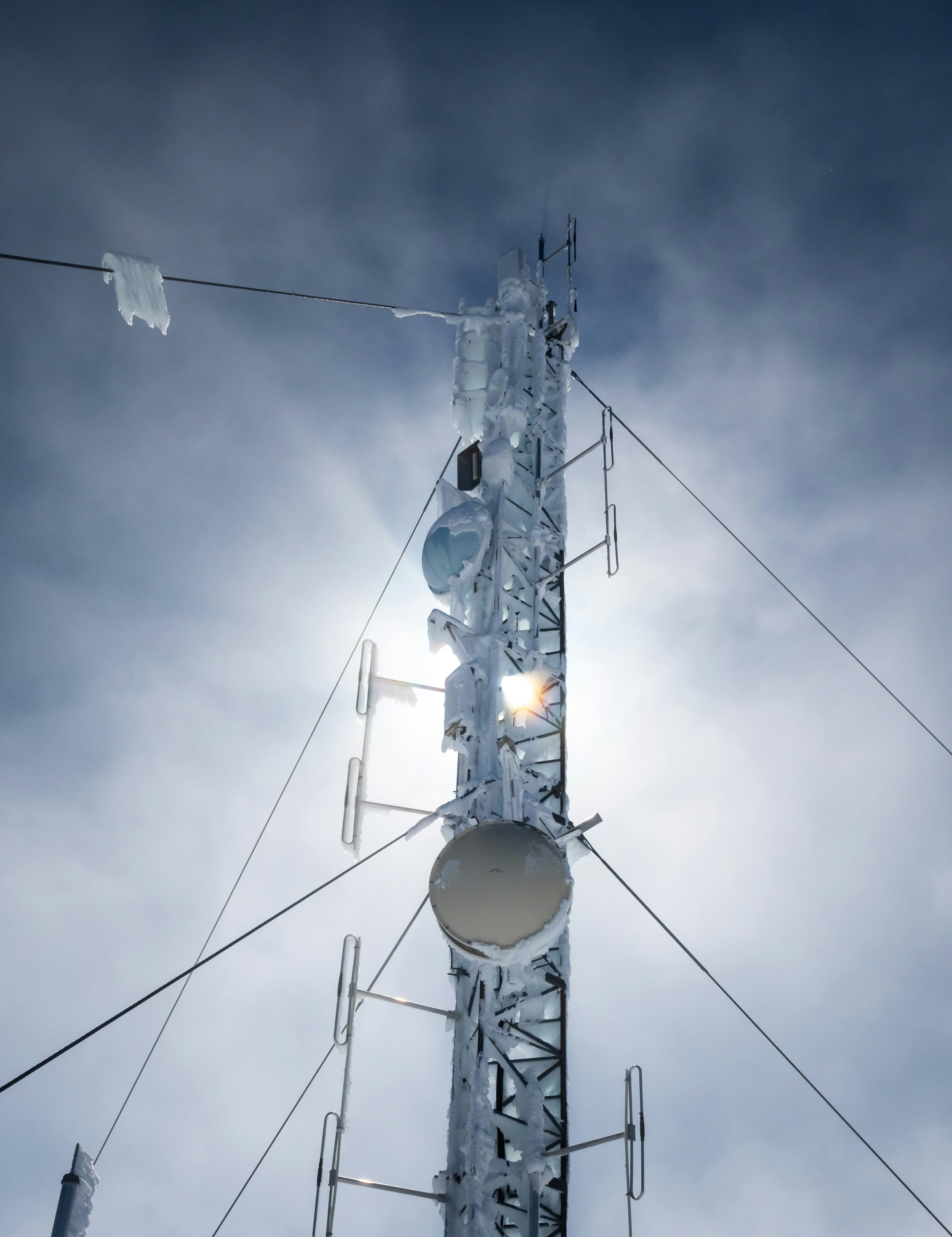 A cell phone tower with a sky background photo – Free Communications ...