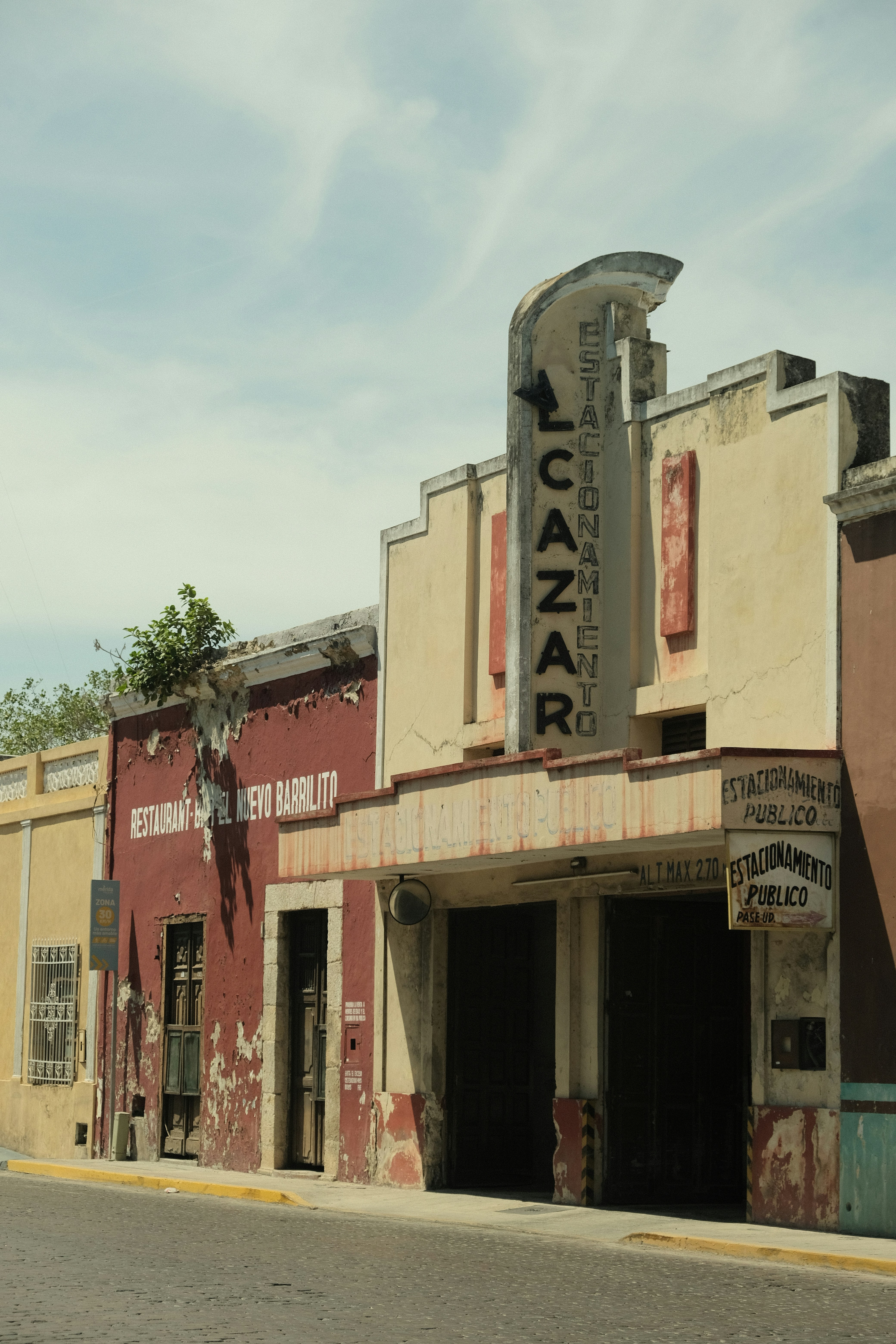 Art Deco Cinema Facade on a Worn Mexican Main Street