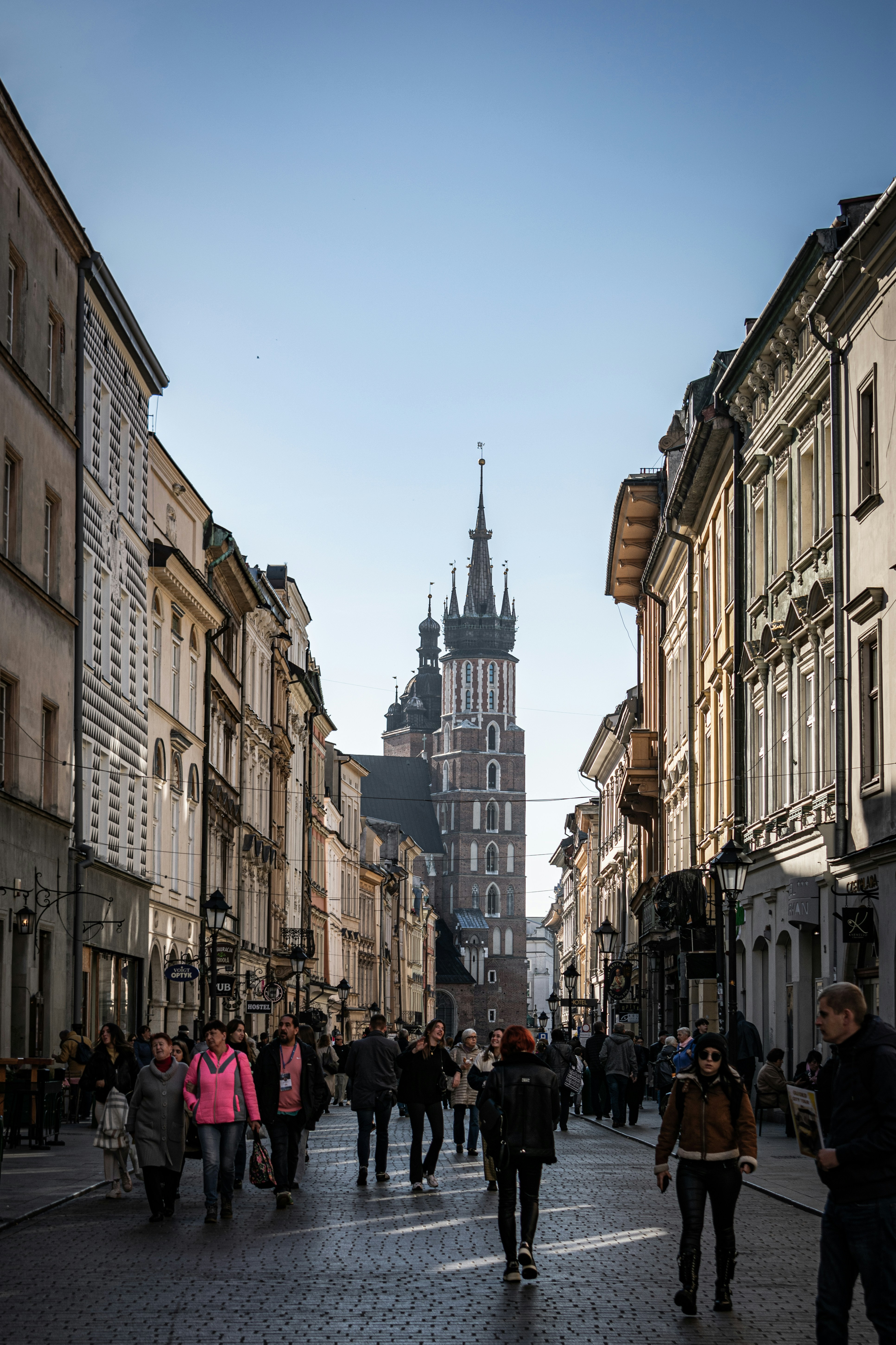 Toward the Twin-Spired Tower: A Pedestrian Street of Stone and Light