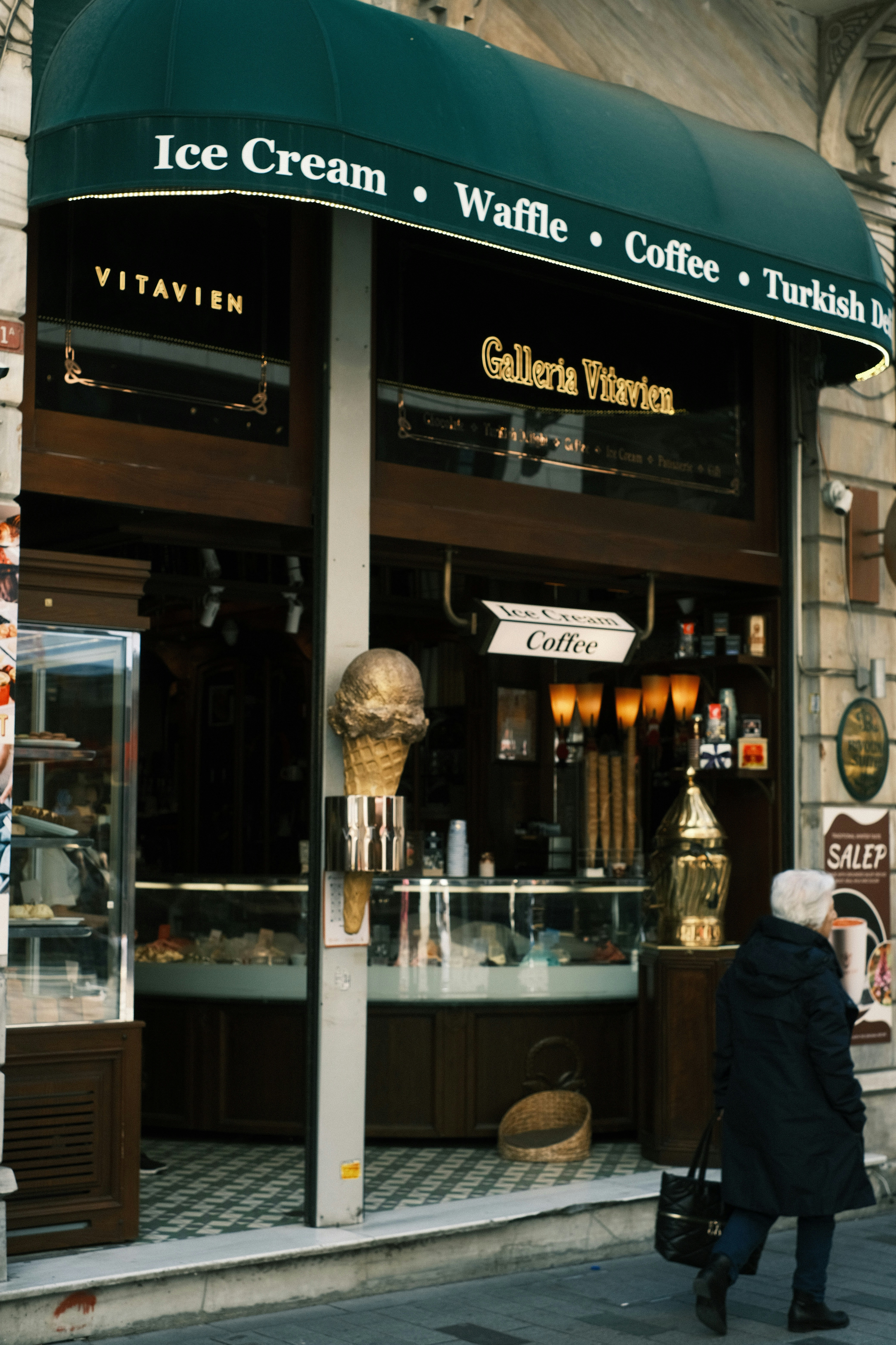 Ice Cream Cone Guardian at a Historic Café Façade