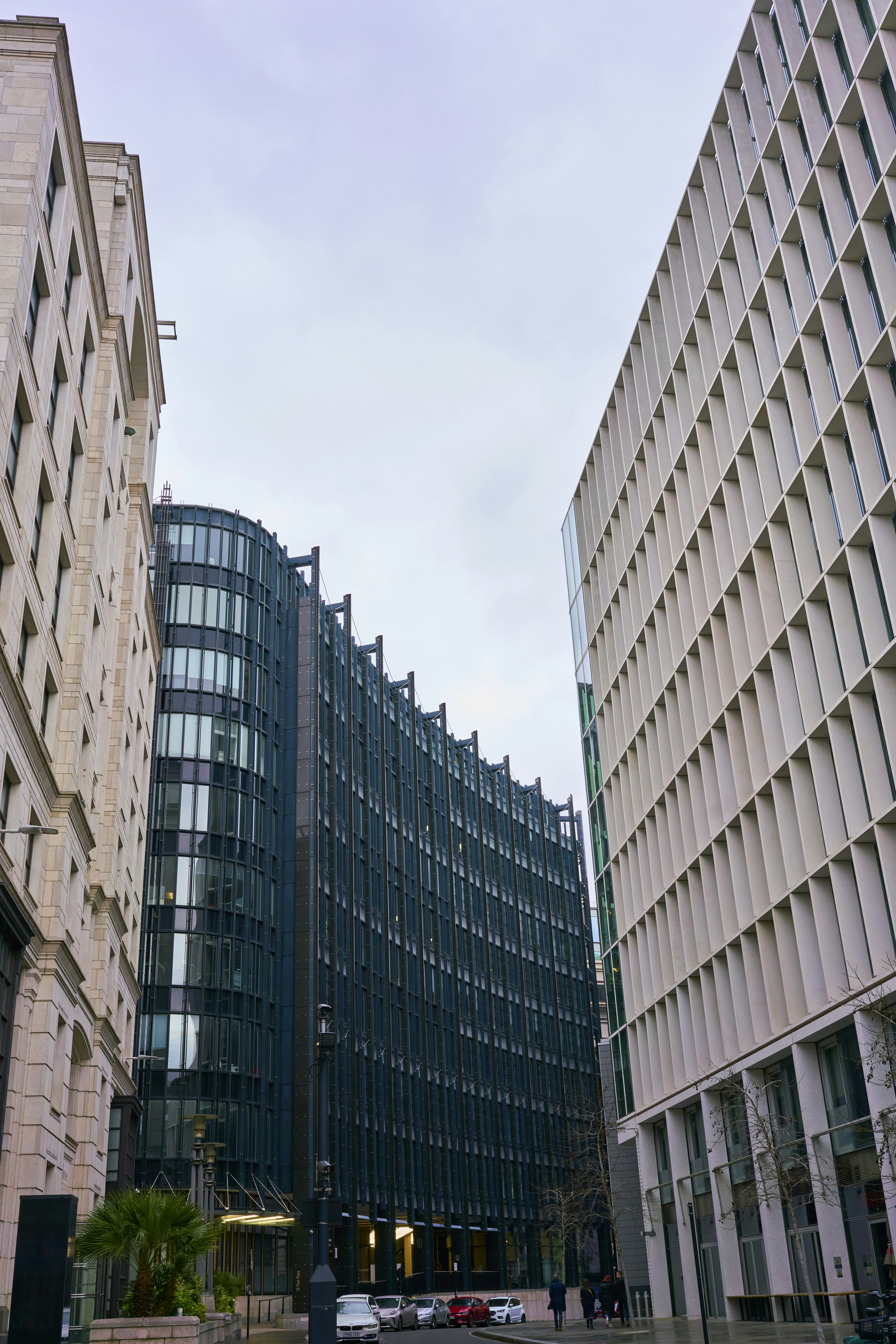 Canyon of Glass: The Blue Arc Between Stone Towers