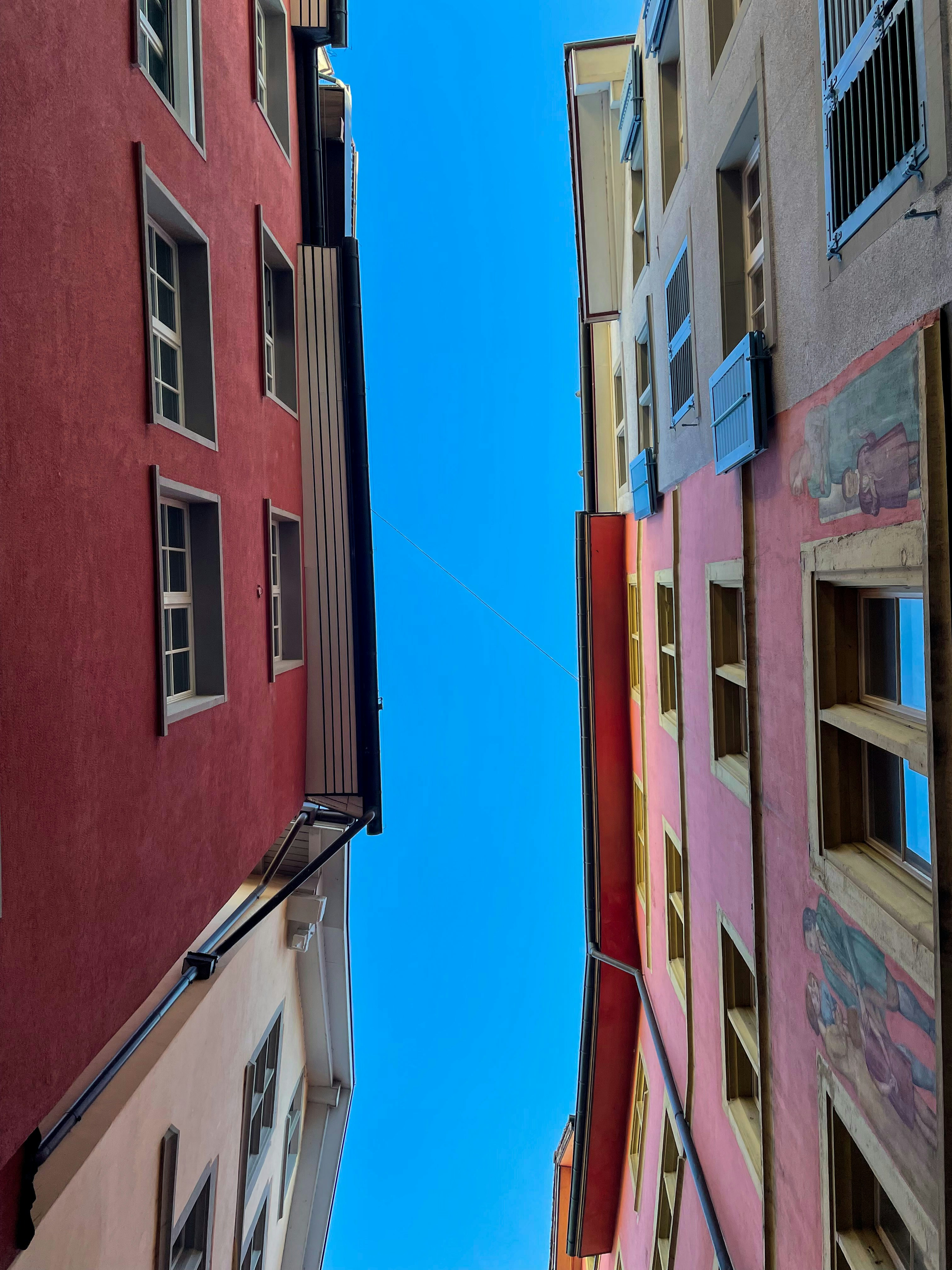 A view of the sky from between two buildings photo – Free Цюрих Image ...