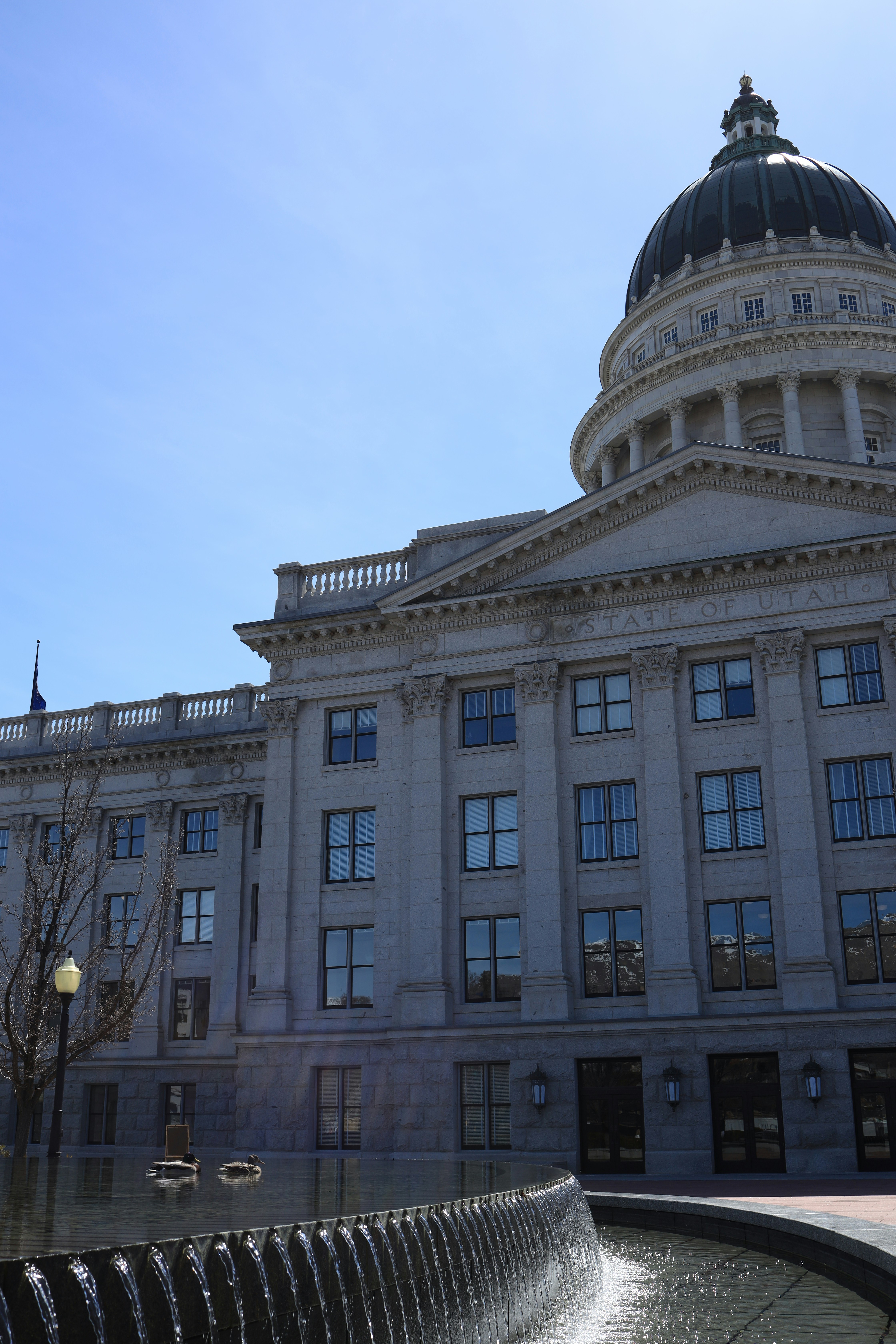 Dome Over Stone: Utah Capitol Courtyard Framed by a Curved Fountain