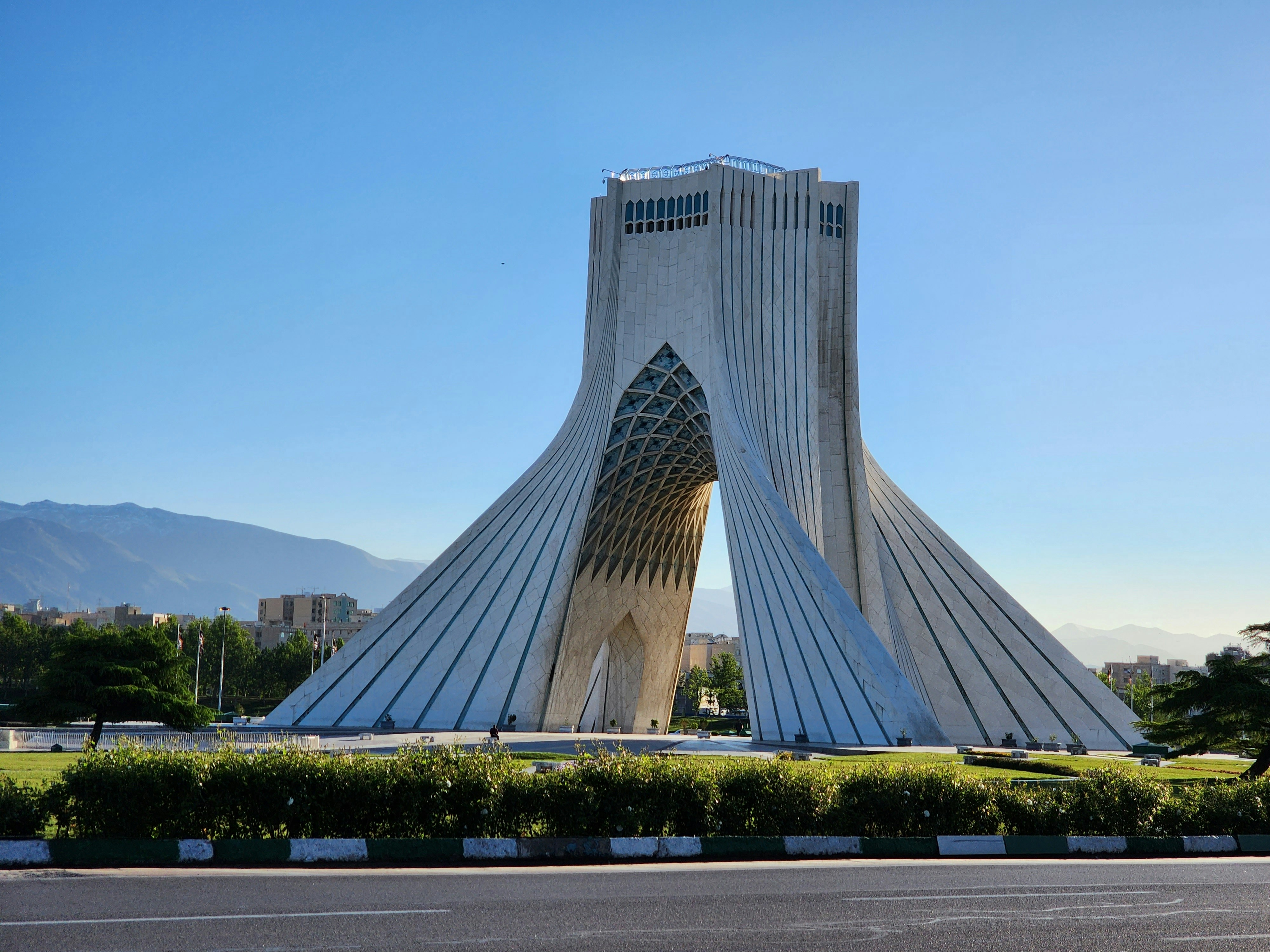 A very tall building with a very tall tower photo – Free Tehran Image ...