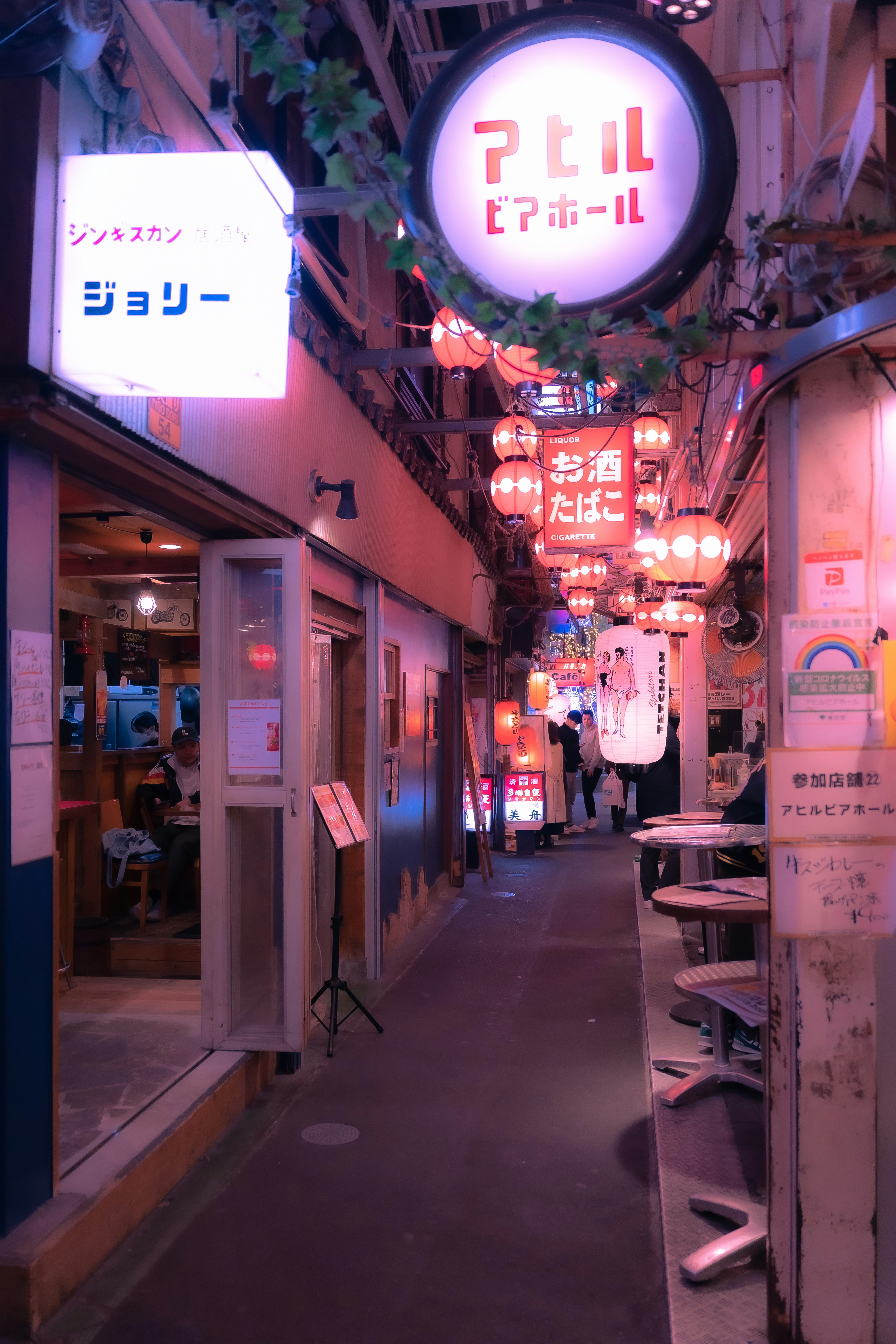 Circular Neon Beacon in a Velvet Tokyo Alleyway