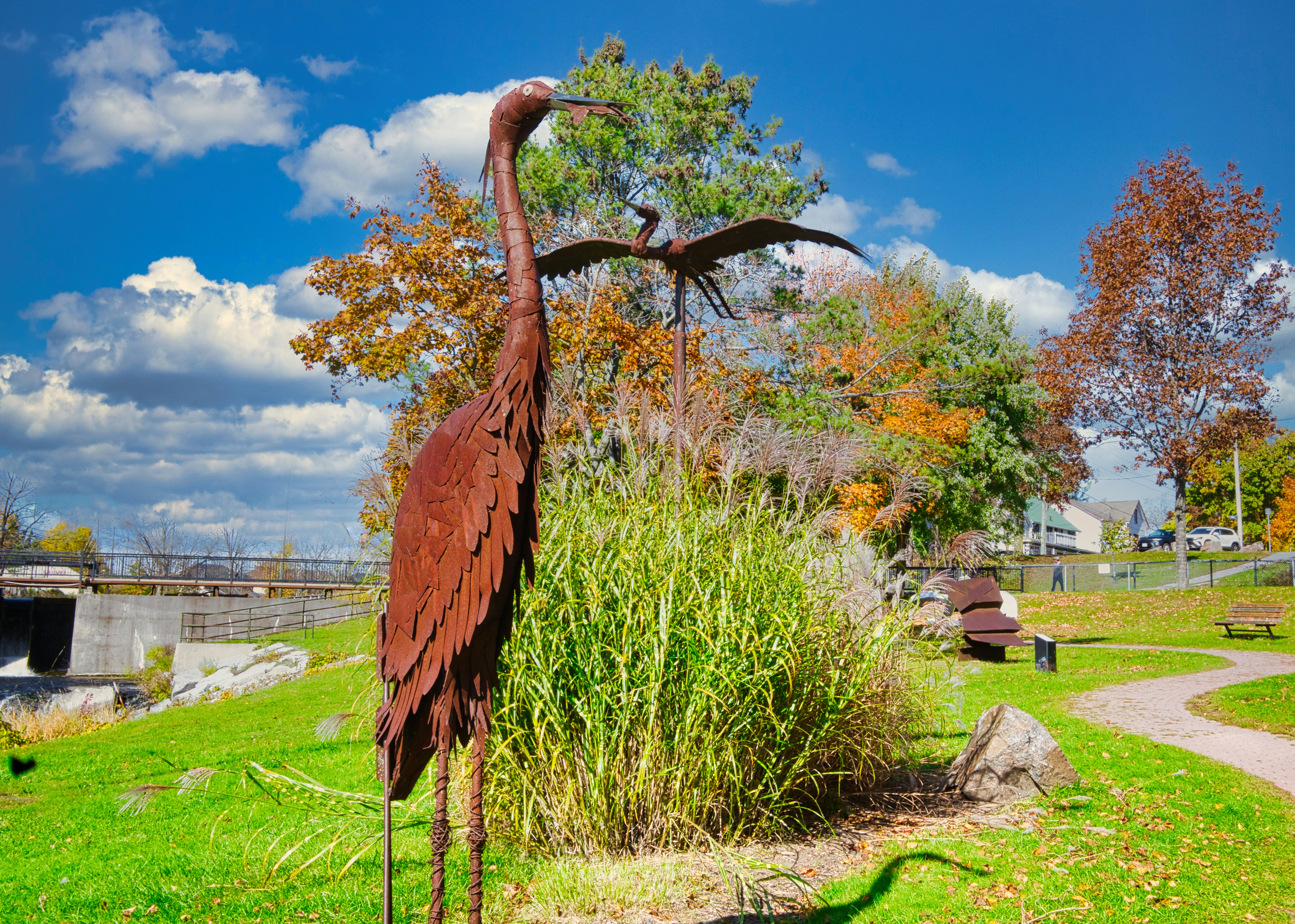 Rusty Crane Sentinel in a Sunlit Autumn Park