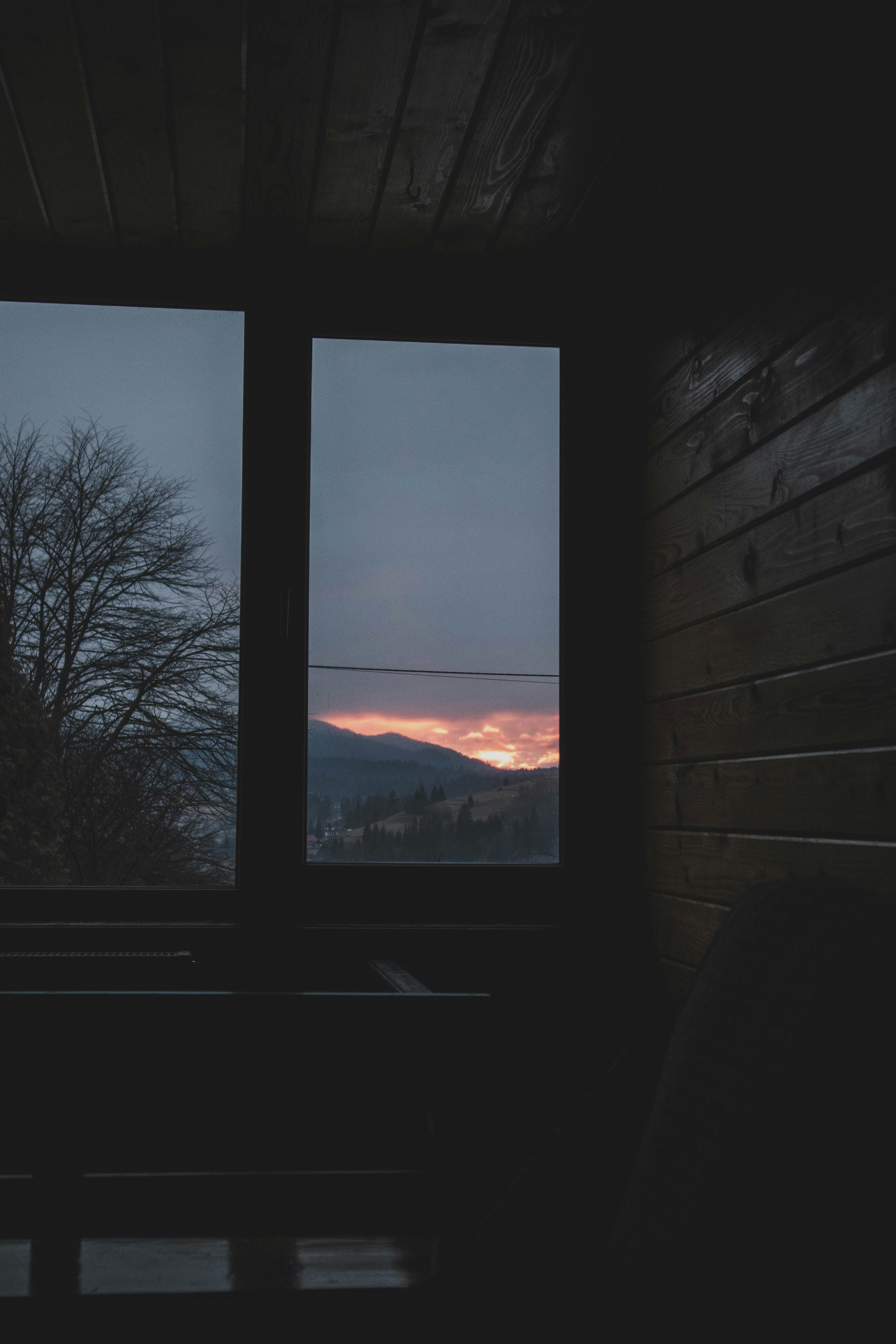 A window with a view of the mountains outside photo – Free Nature Image ...