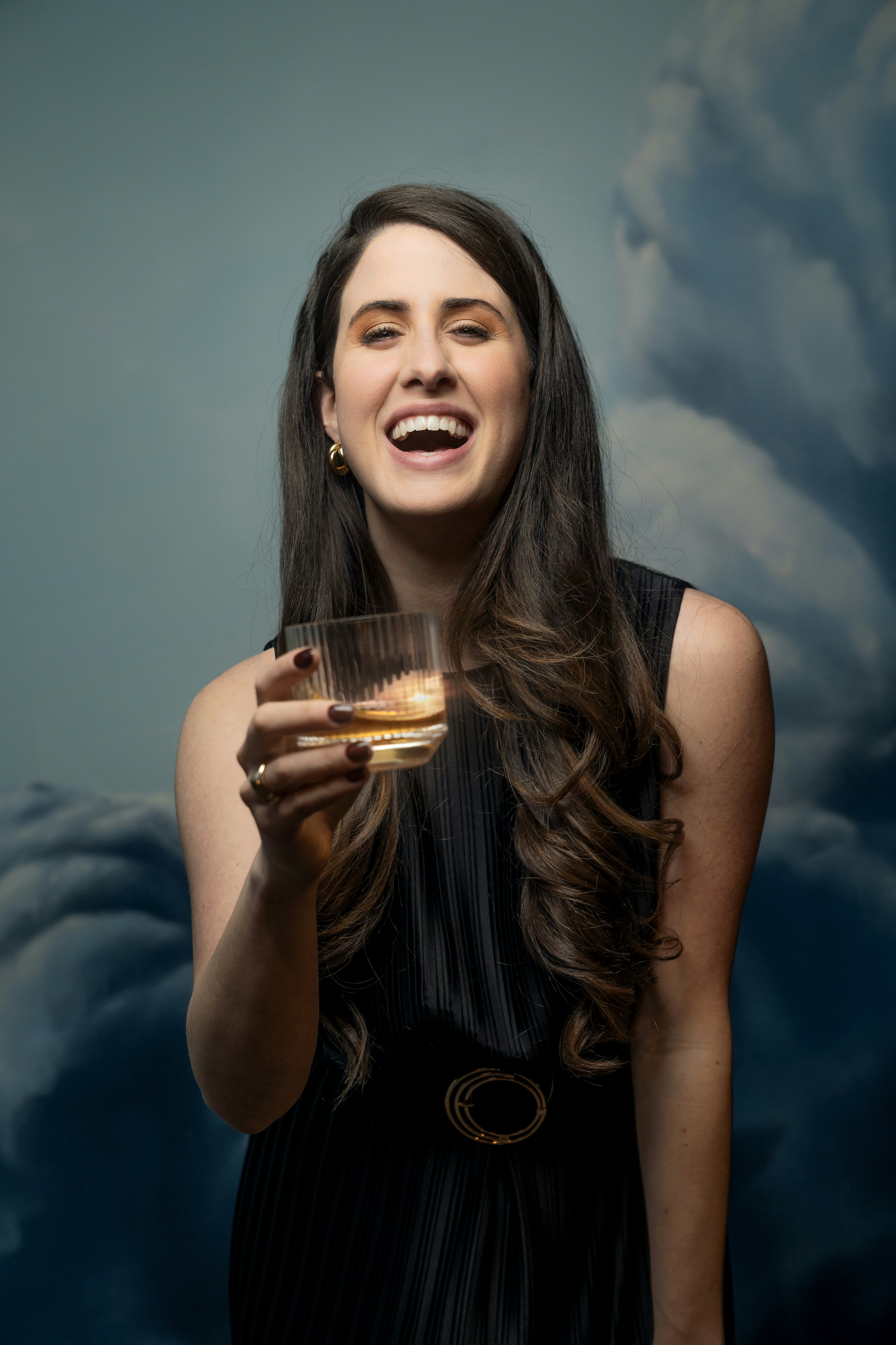 Toast Under a Painted Sky: A Jubilant Studio Portrait