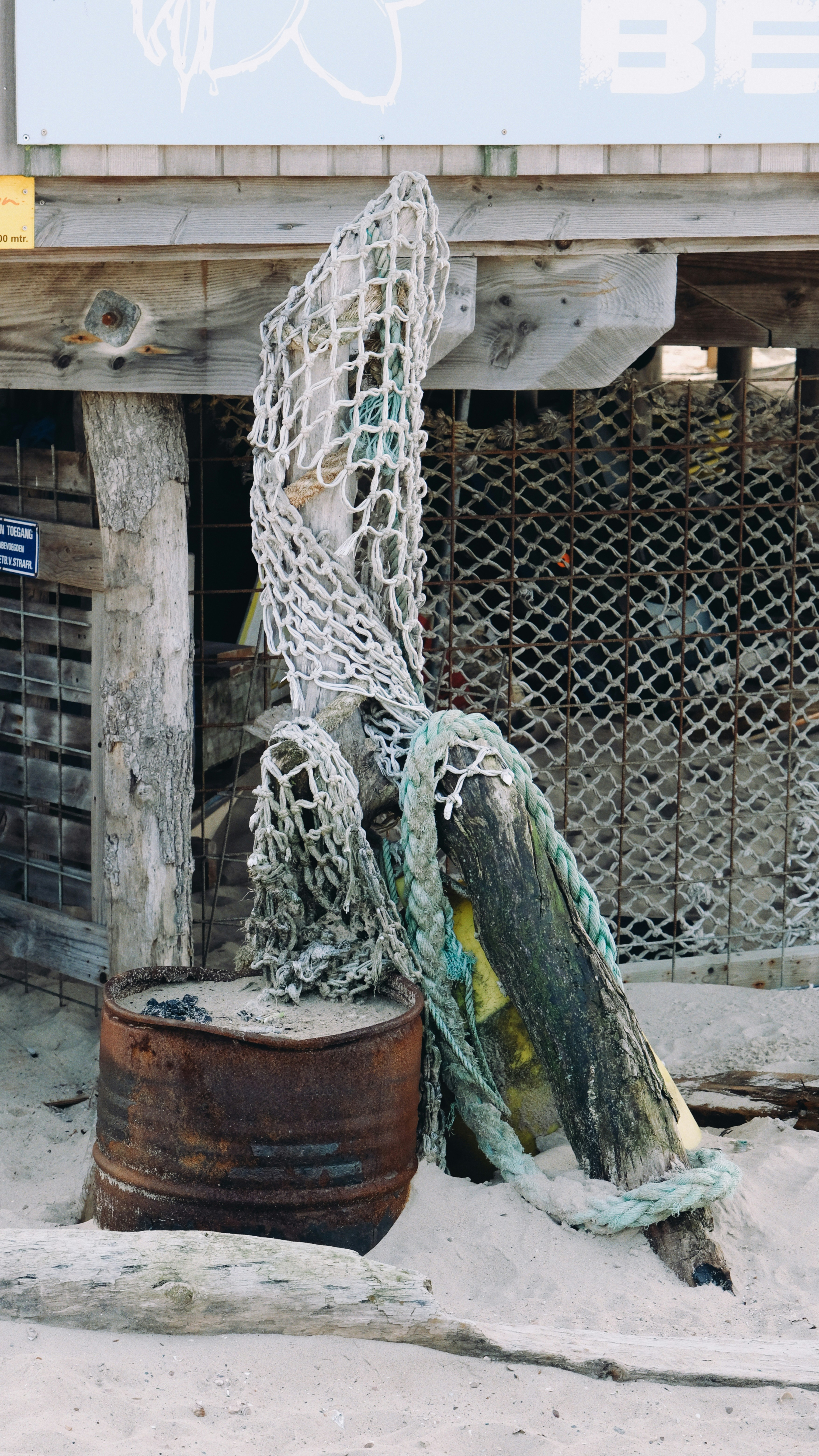 Rope, Netting, and Rust: A Quiet Dock Corner