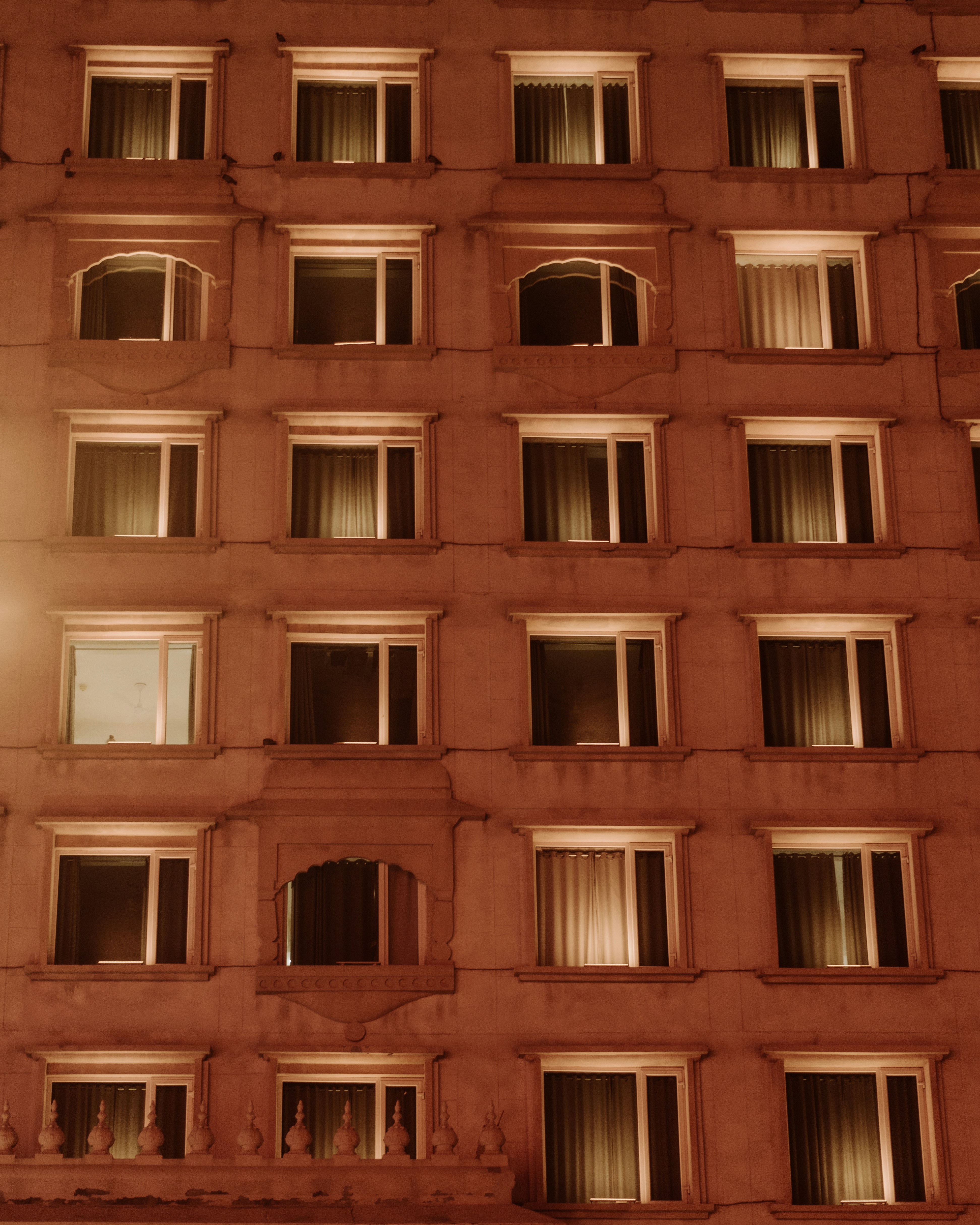 Illuminated Facade: A Glimpse into Urban Life