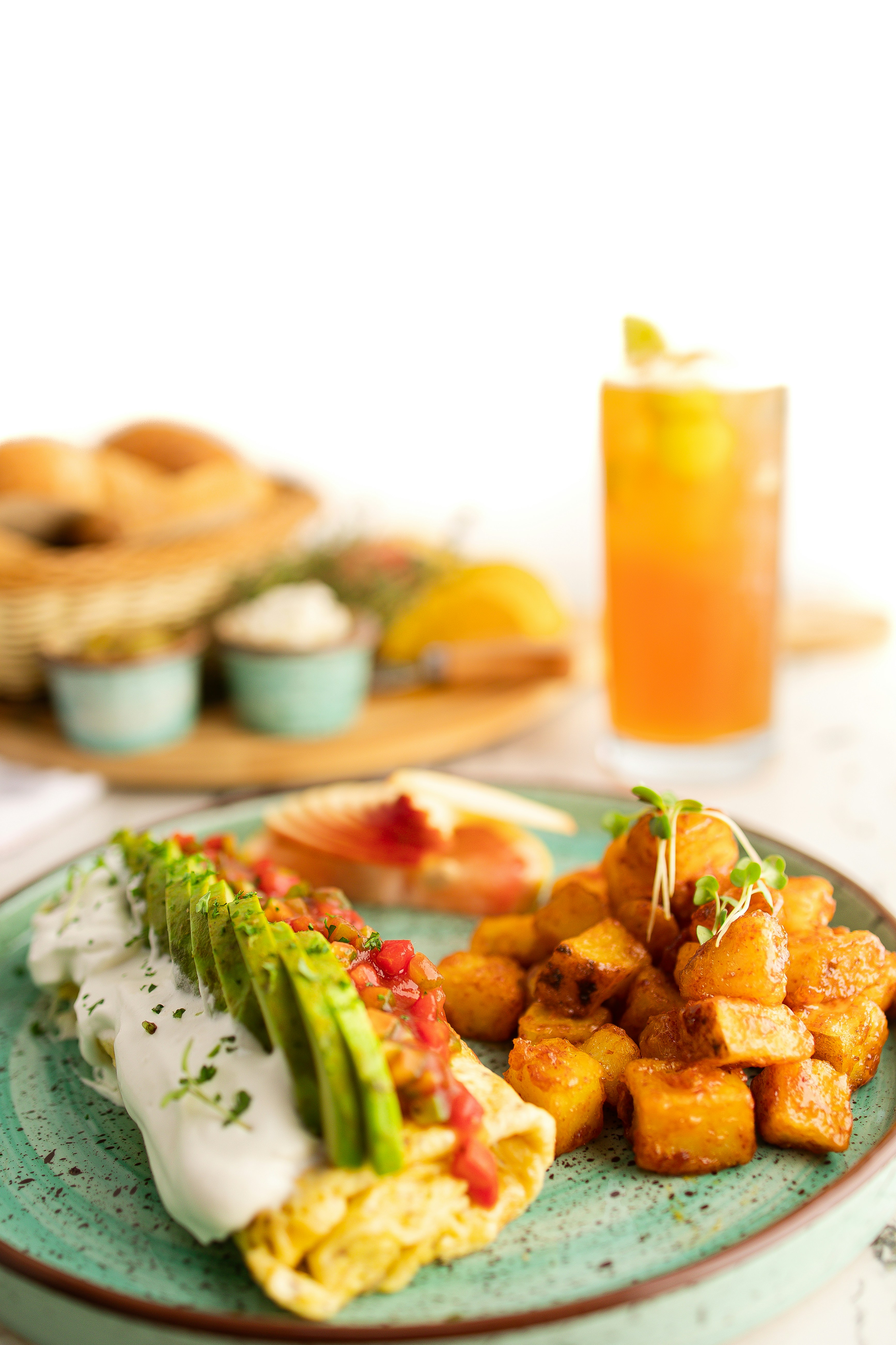 Crispy-Ceved Comfort: A vibrant plate of avocado toast with spiced potatoes
