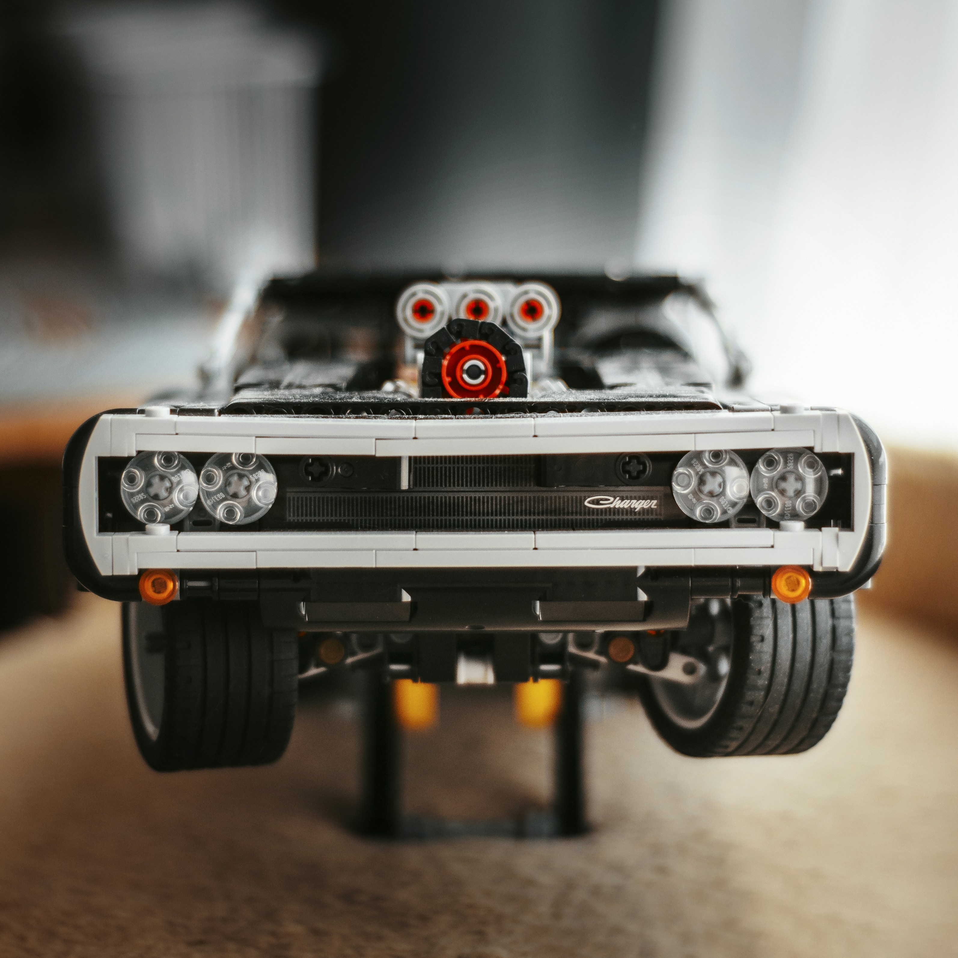 A toy model of a car on a table photo – Free Toy Image on Unsplash