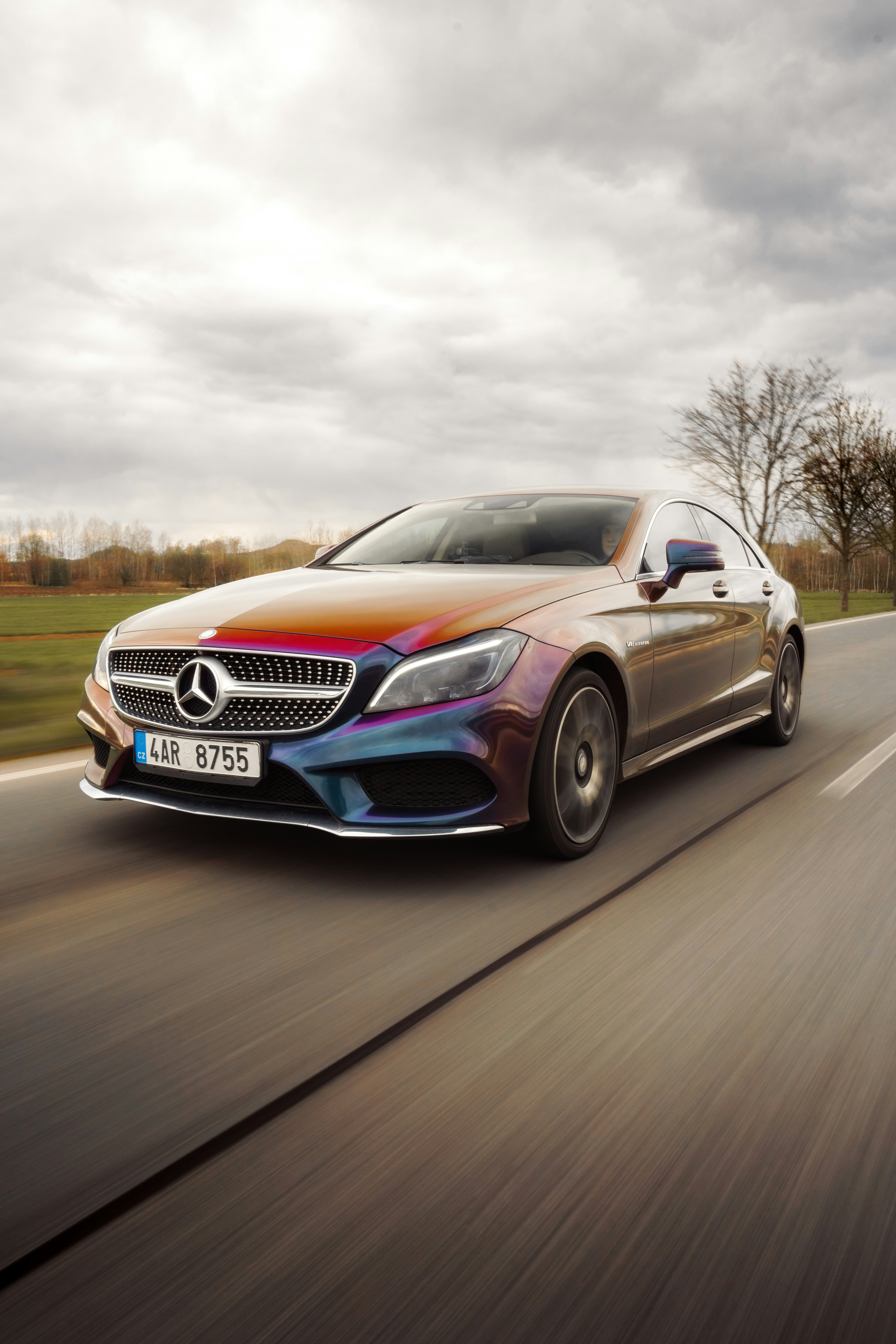 A car driving down a road with a sky background photo – Free Pisek ...