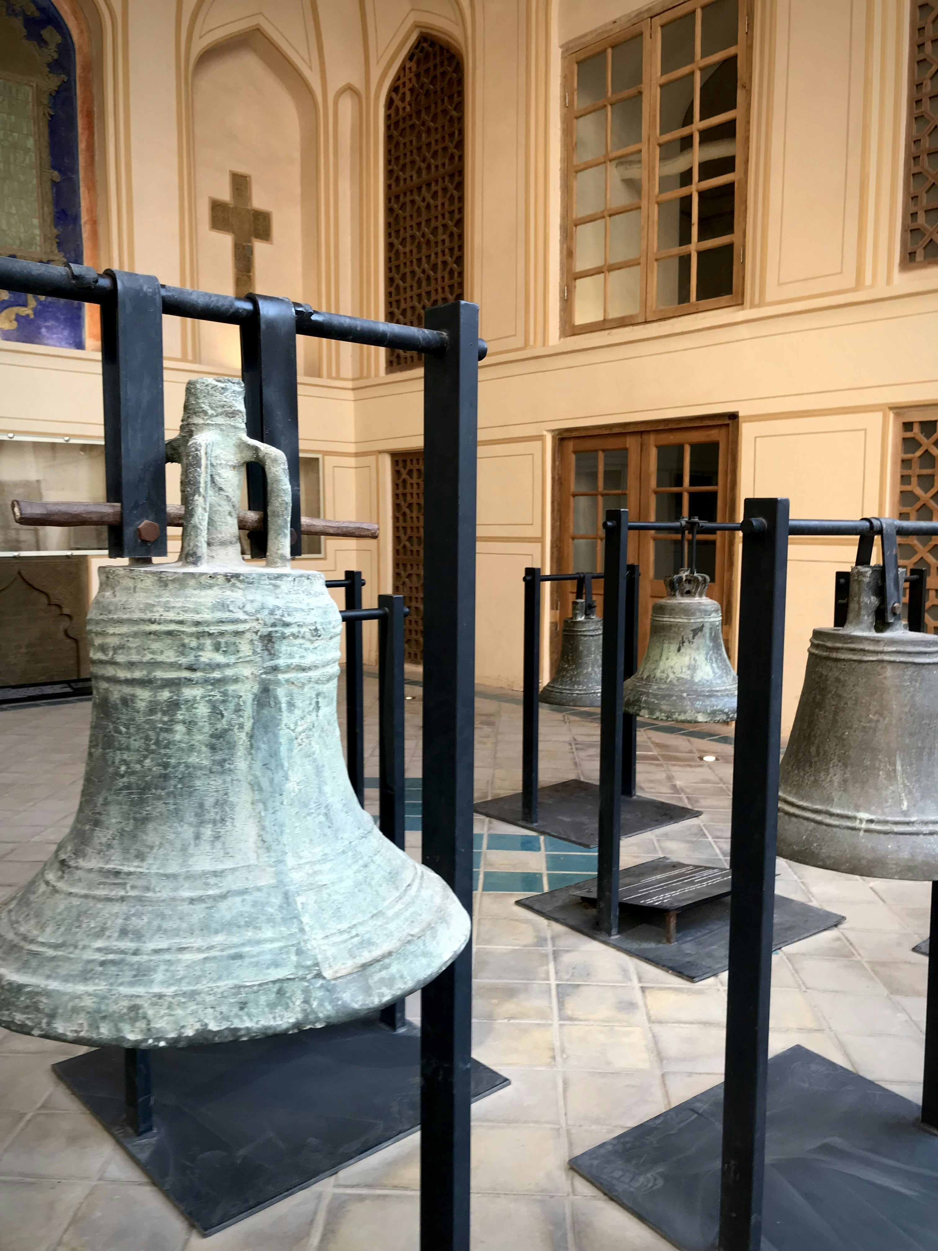 Echoes of Time: Ancient Bells in a Historic Hall