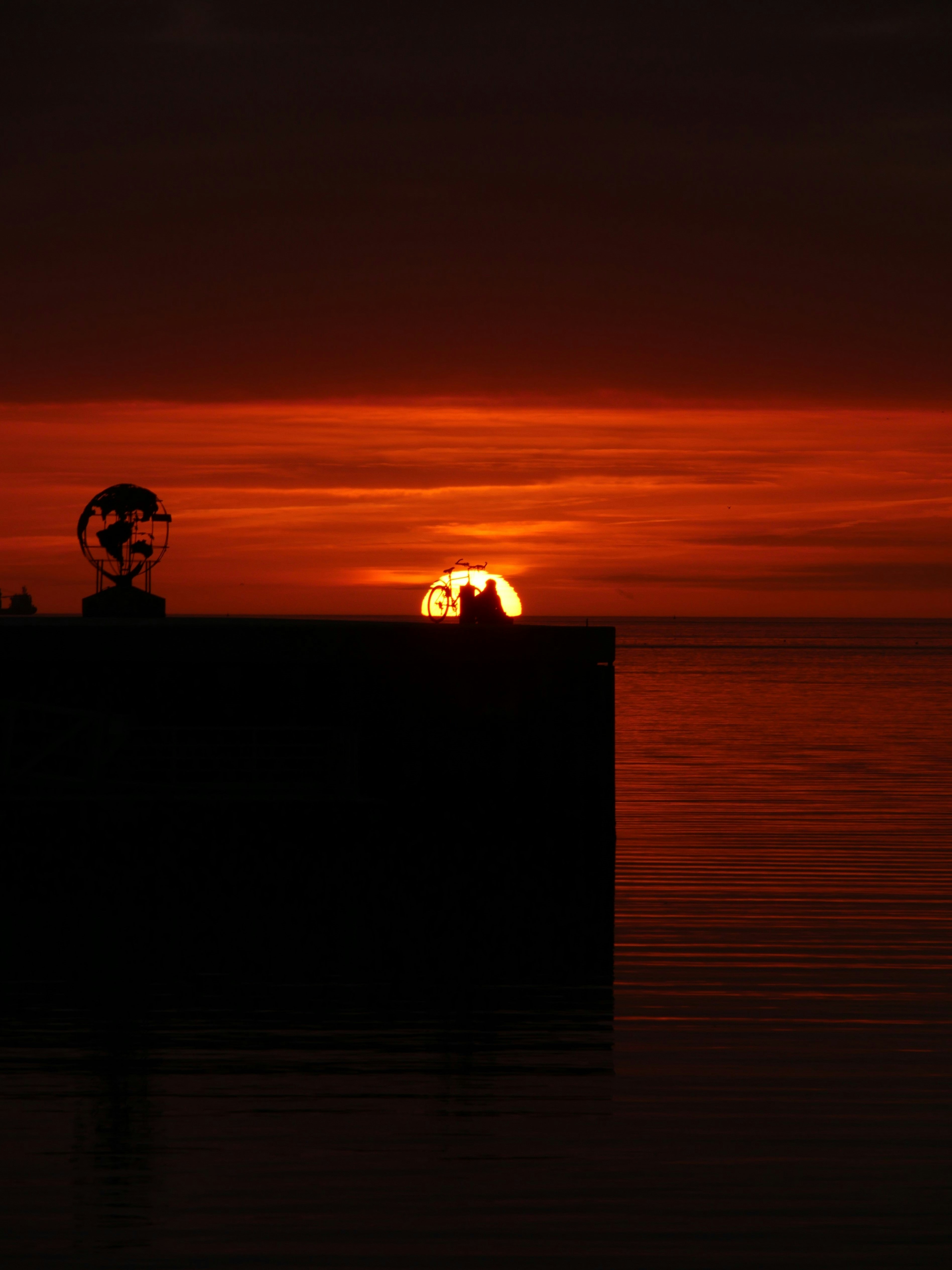 Sunset on the Pier: Silhouette at Dusk