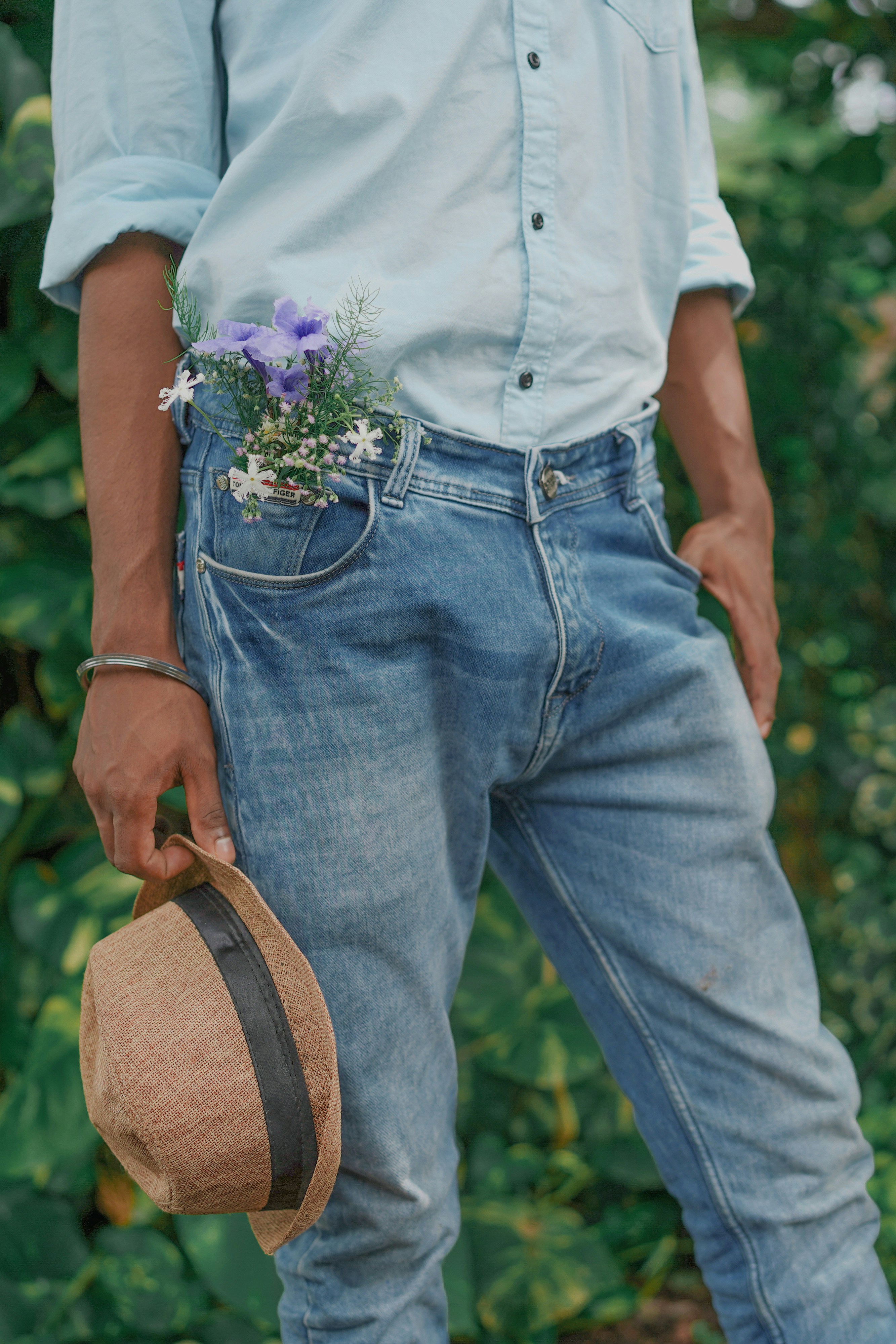 Pocket Bloom: A Denim Portrait with a Hidden Bouquet