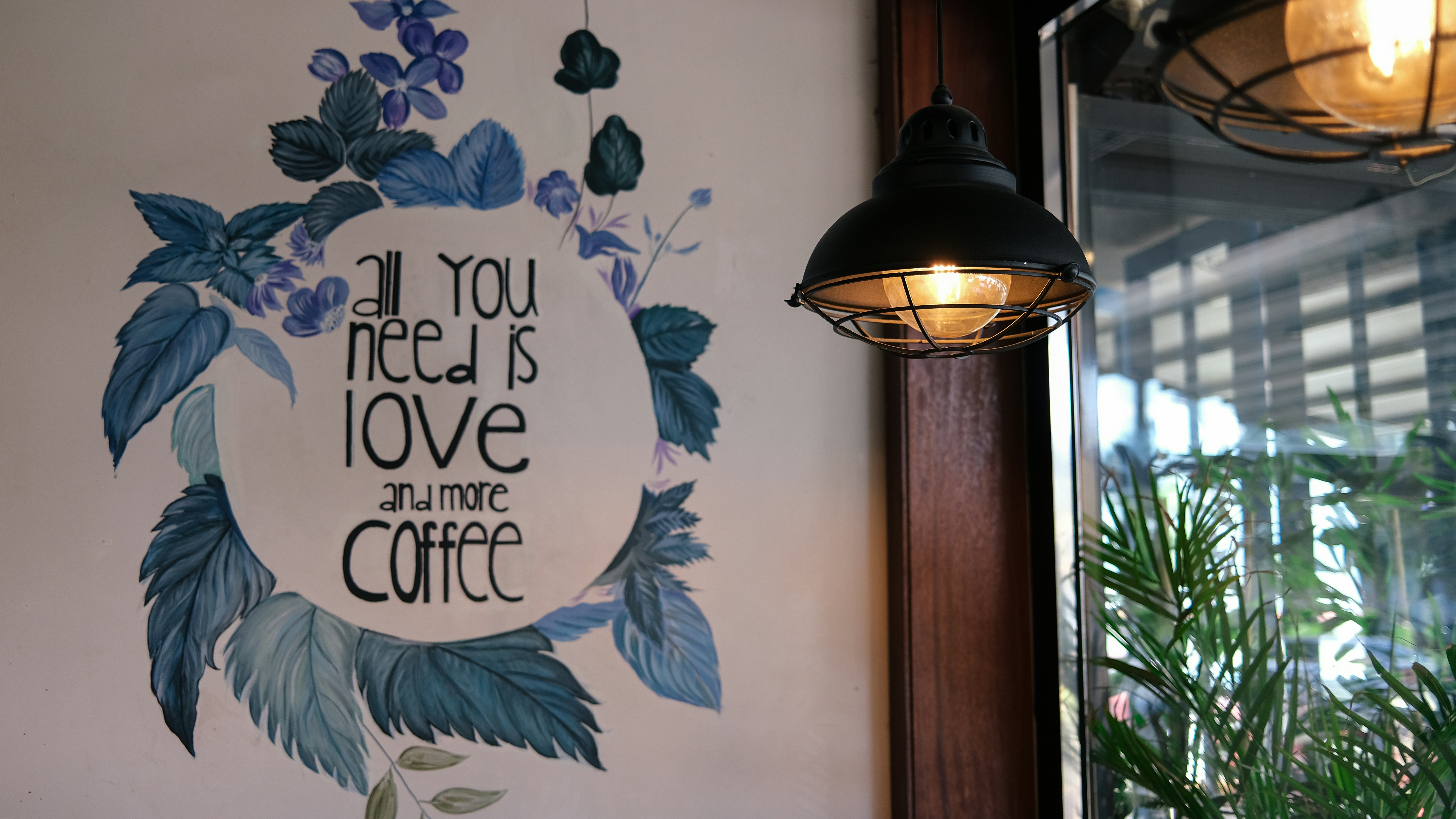 Coffee, Script, and Skylight: A Corner Café Portrait
