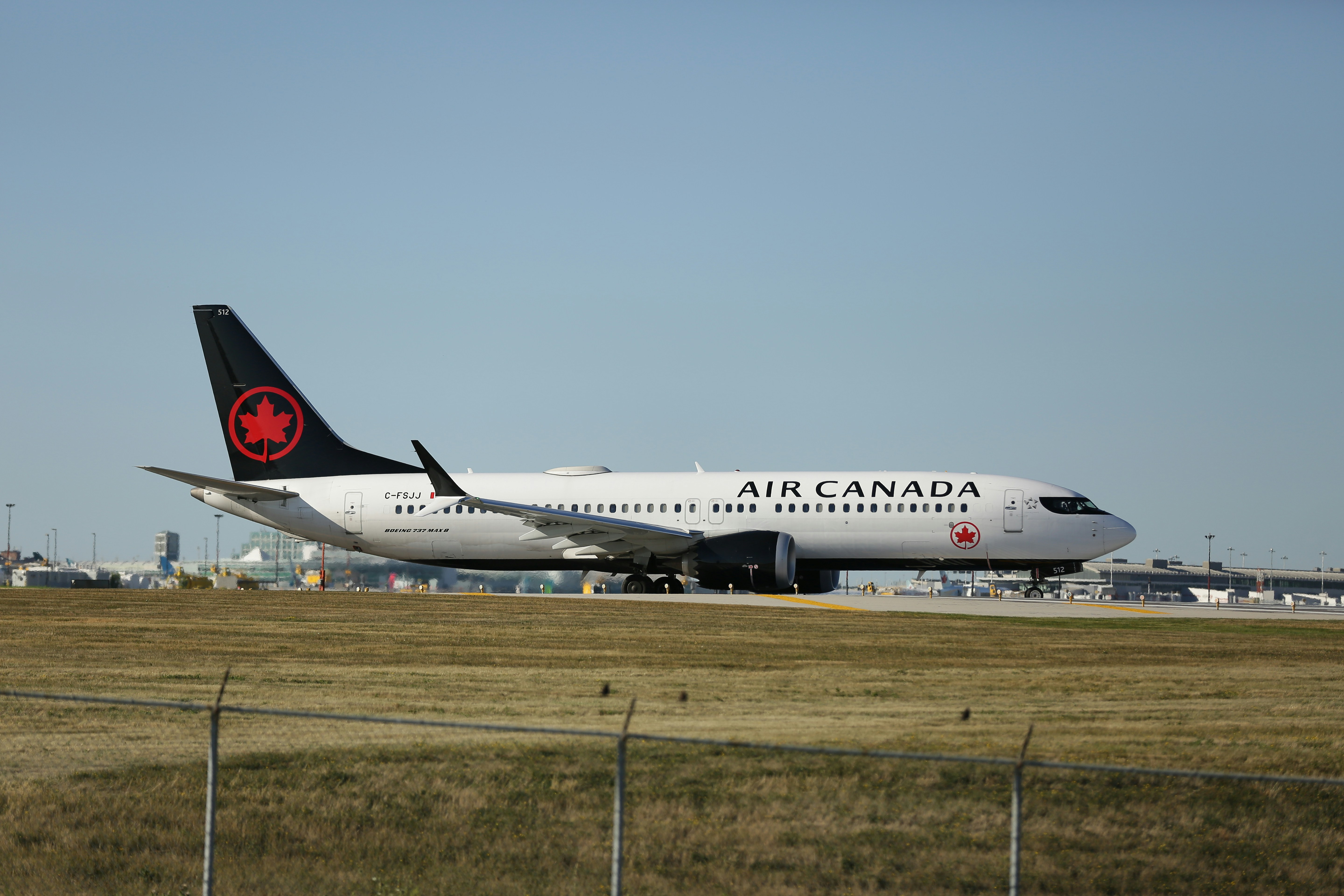 A large air canada airplane on a run way photo – Free Toronto pearson ...
