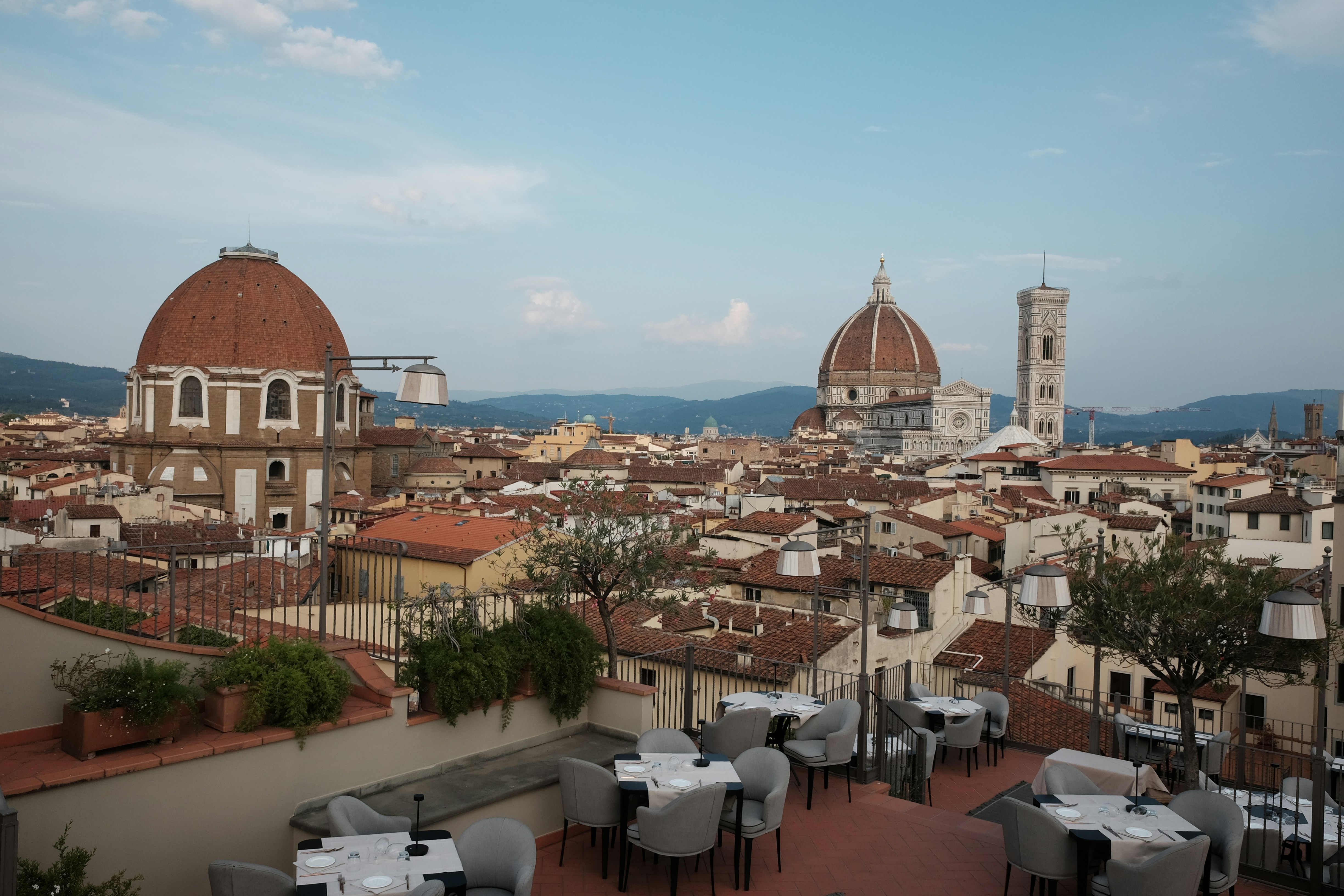 Terrace Dining Over Florence: Duomo Domes Framing the Sky