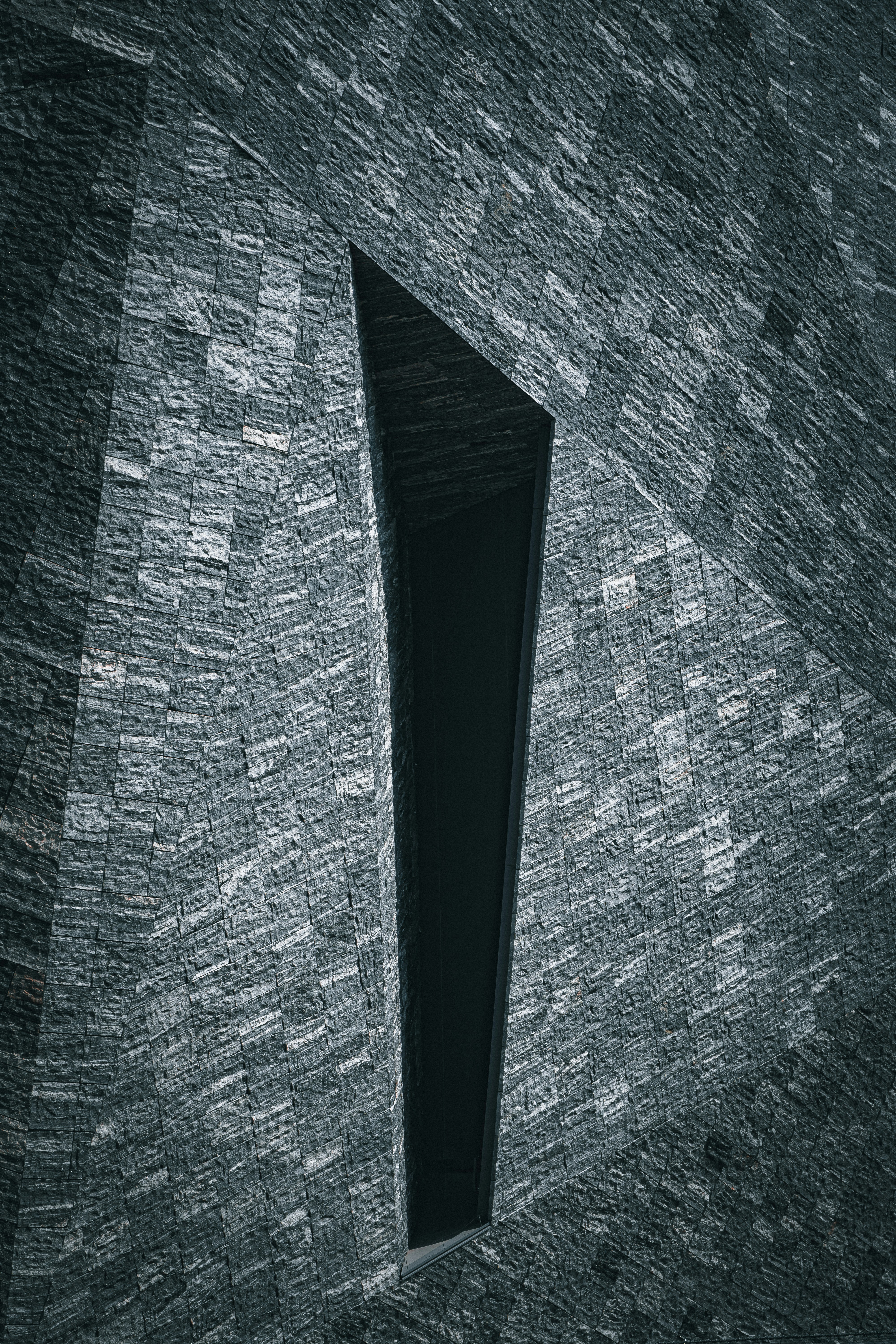 Sliver of Silence: A Vertical Rift in a Stone Facade