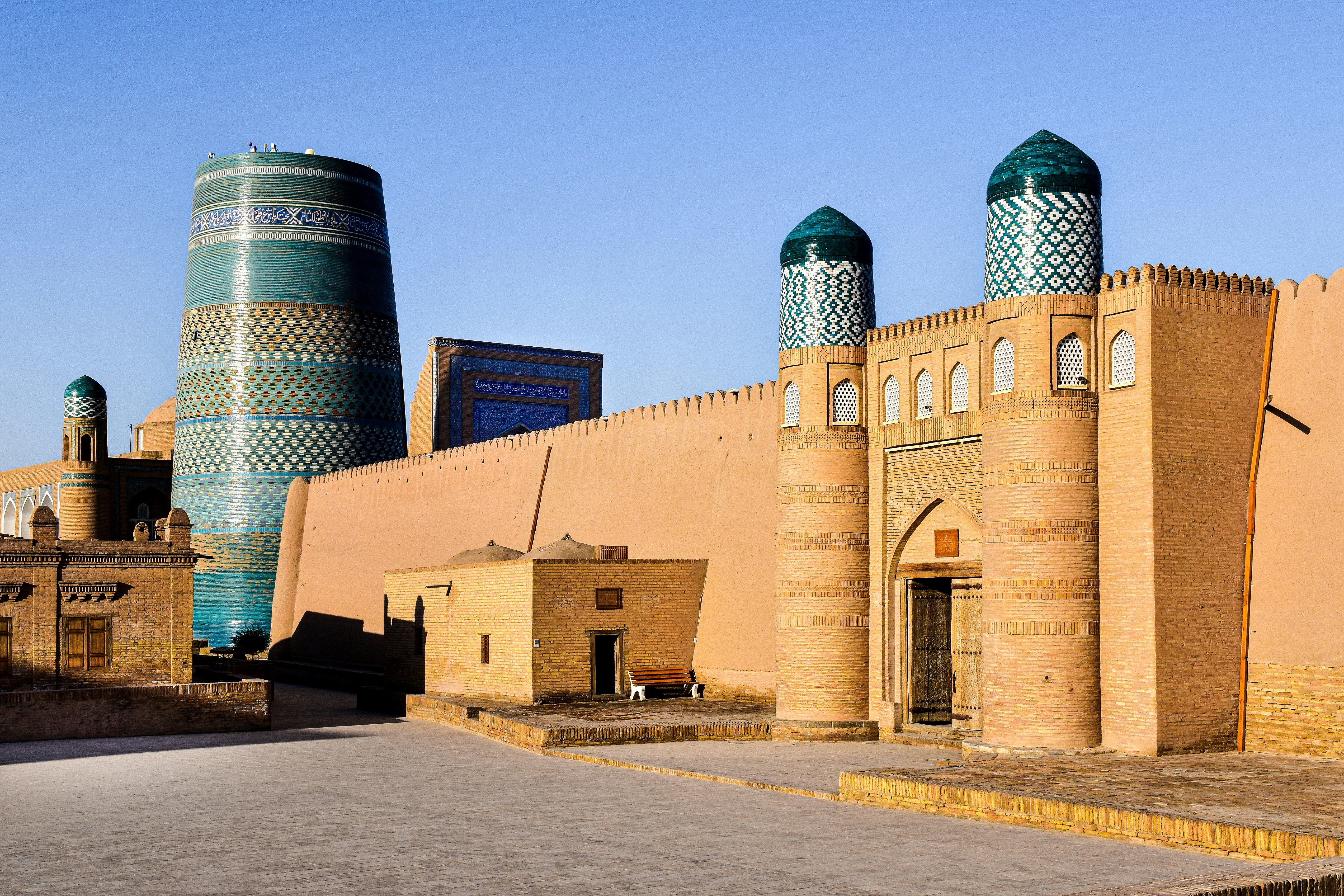 A large building with two towers and a sky background photo – Free ...