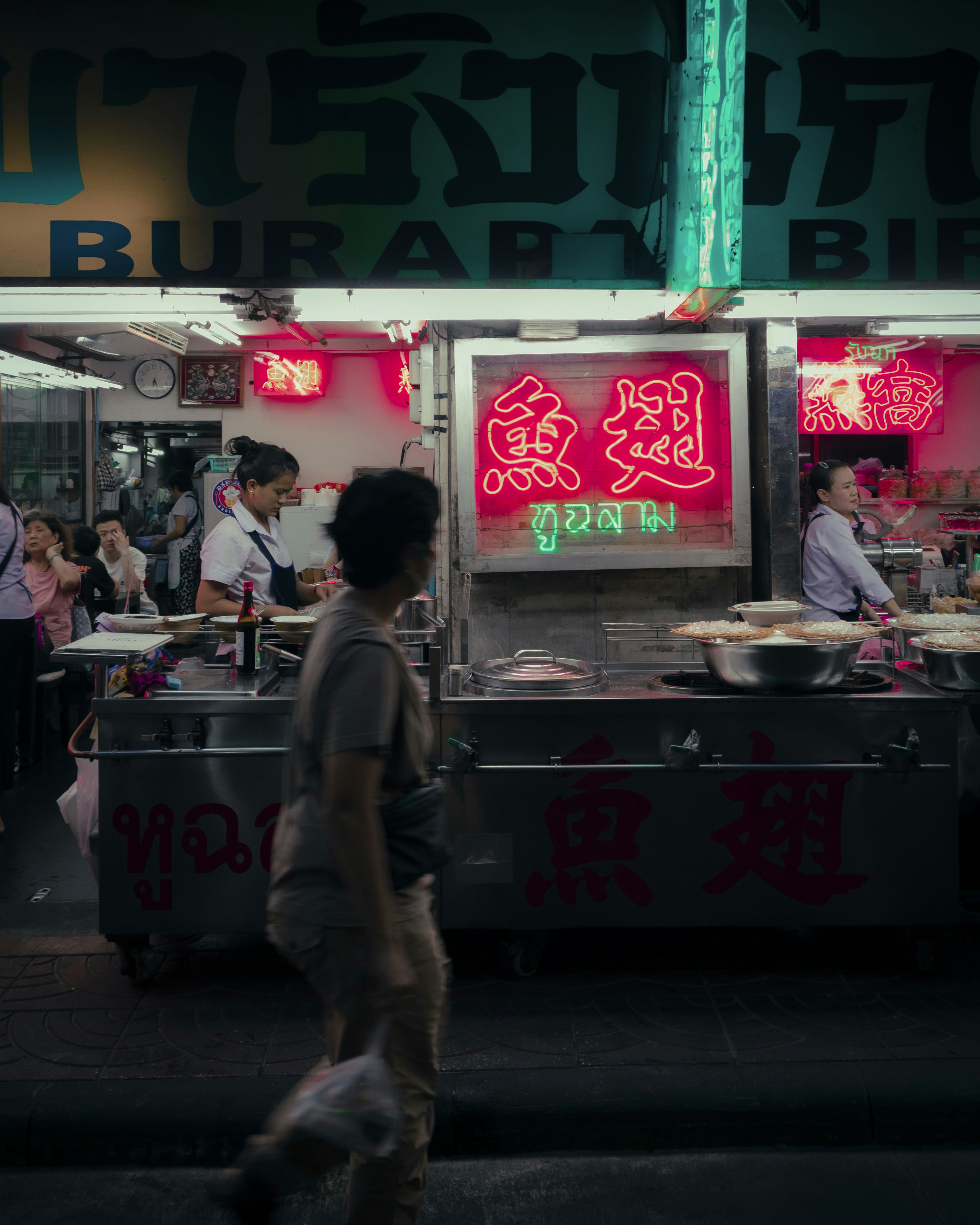 Red Neon Over Steam: A Bustling Night Market Food Cart