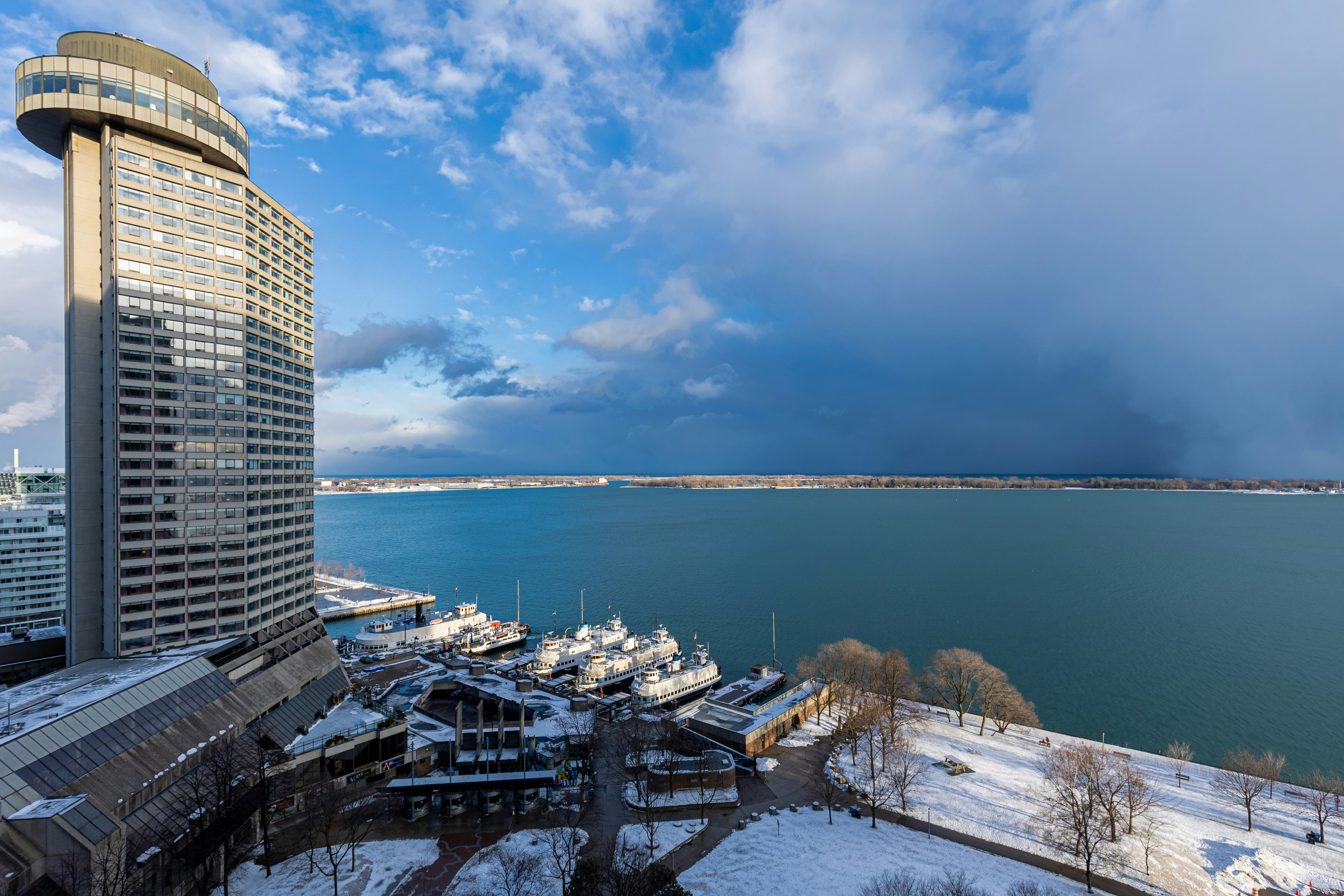 Cobalt Harbor, Snowbound: The Towered Edge Over a Quiet Marina