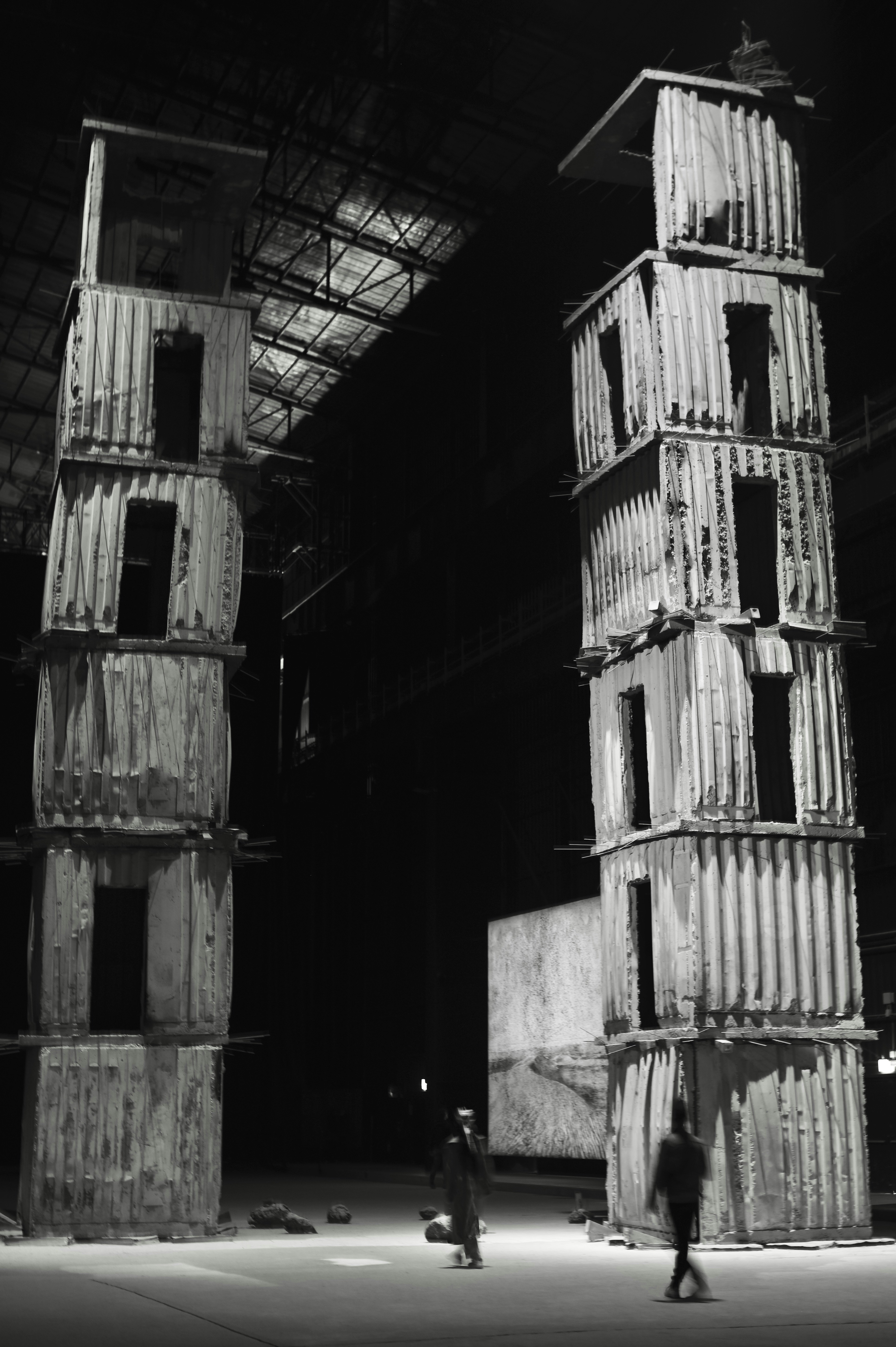 Industrial Monoliths: Silent Towers in a Dim Arena