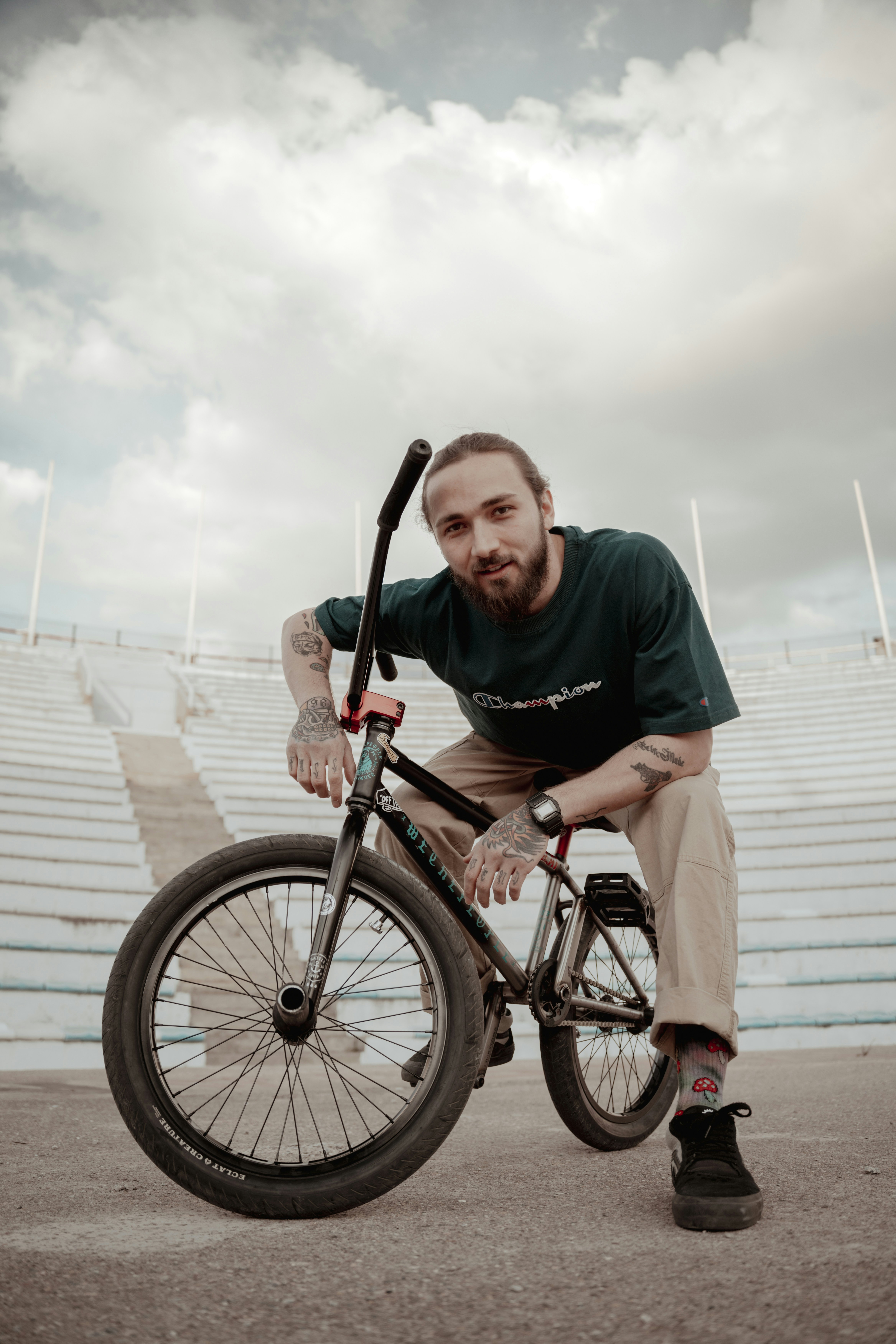 The Quiet Arena: BMX Rider at Center Stage
