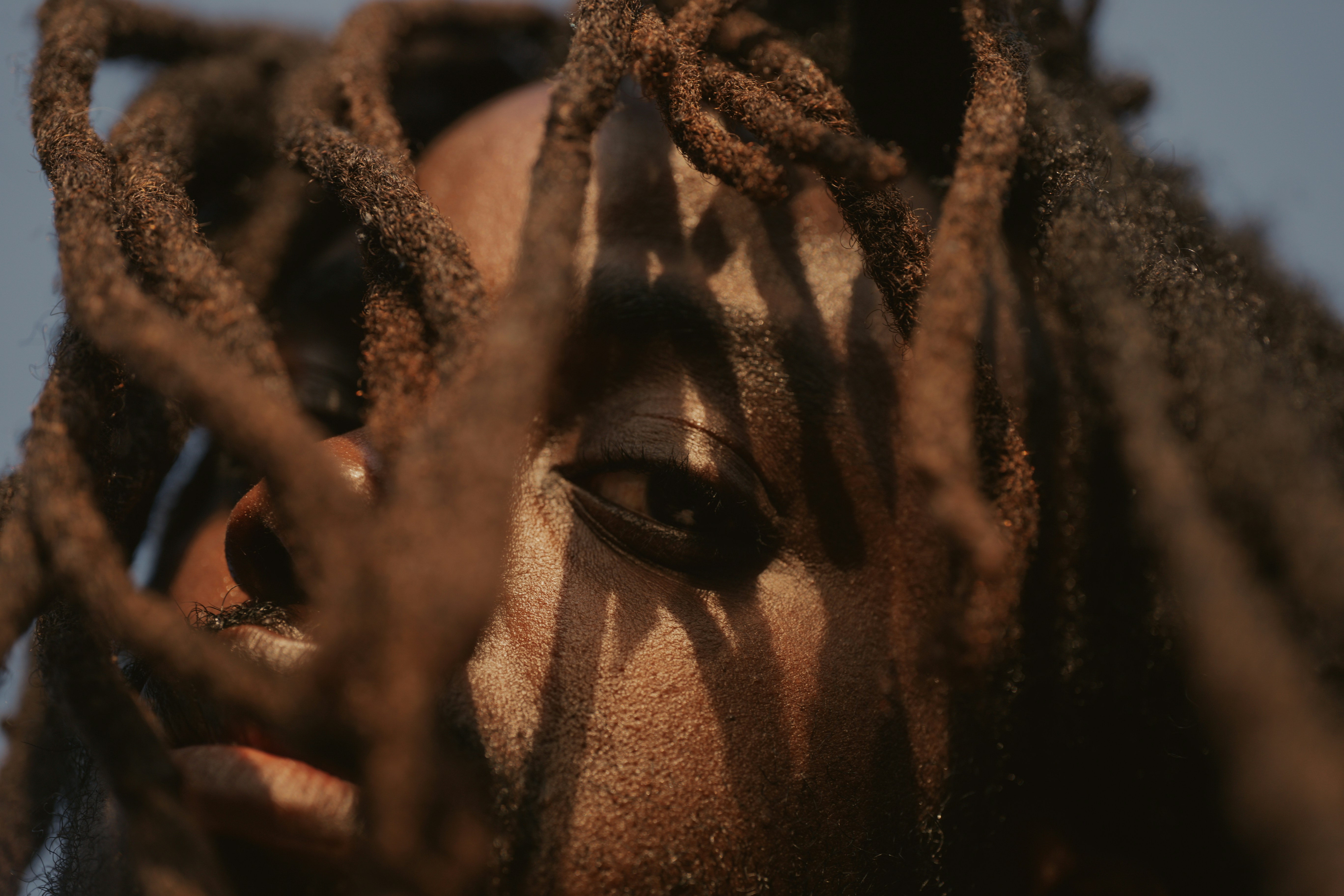 A close up of a person with dreadlocks photo – Free Portrait Image on ...
