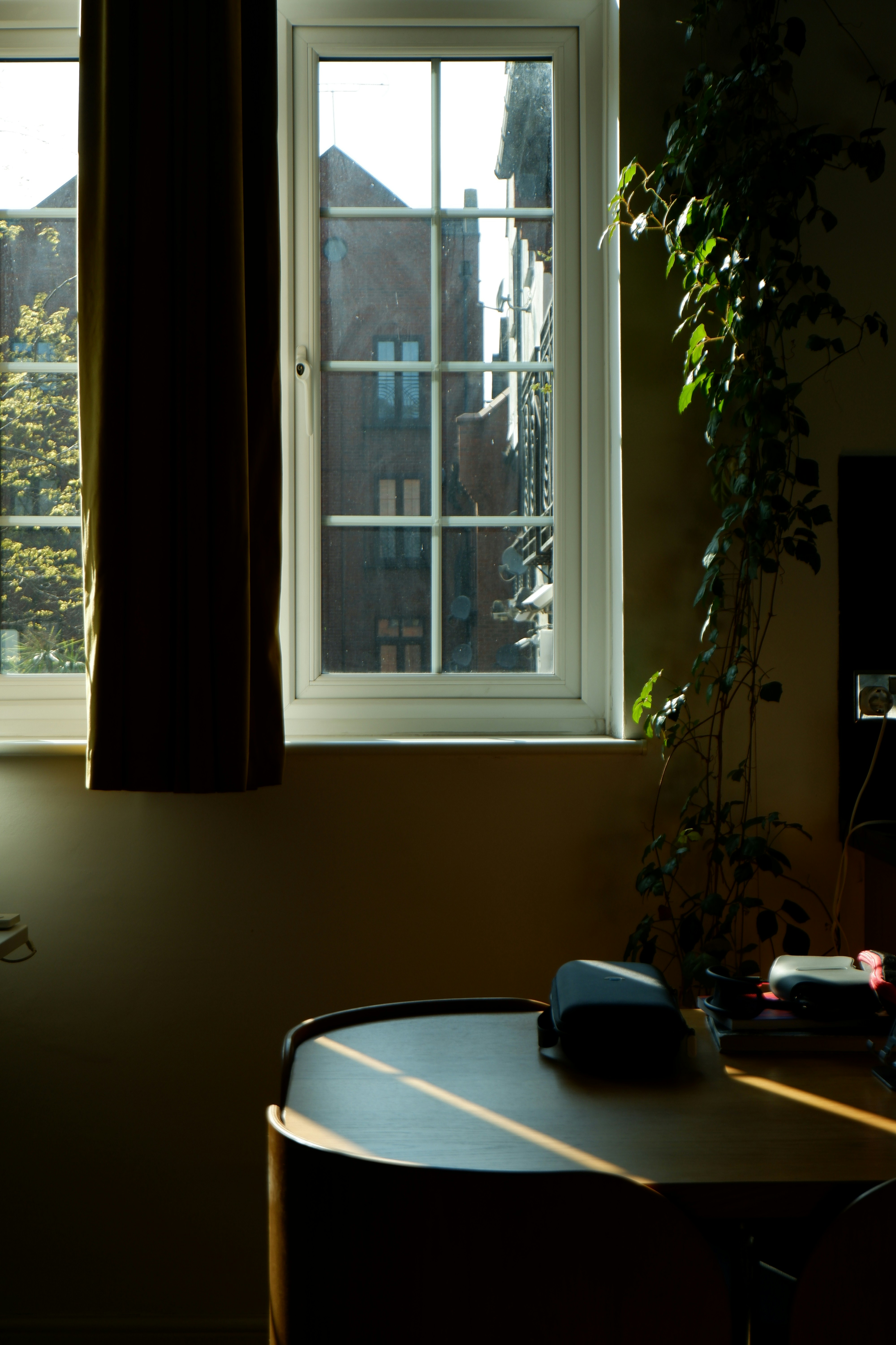 A room with a table and a large window photo – Free London Image on ...