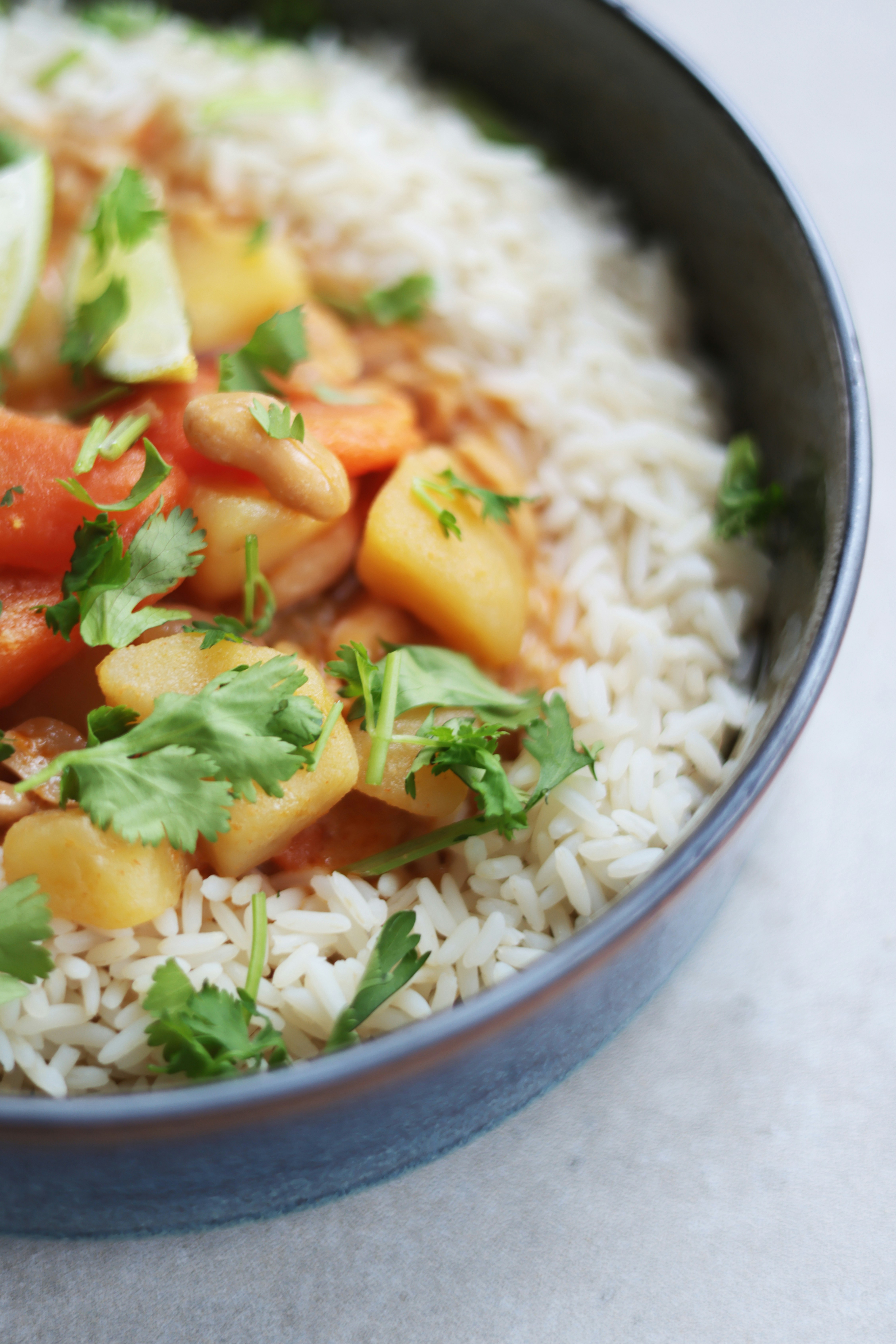 A bowl filled with rice and vegetables on top of a table photo – Free ...