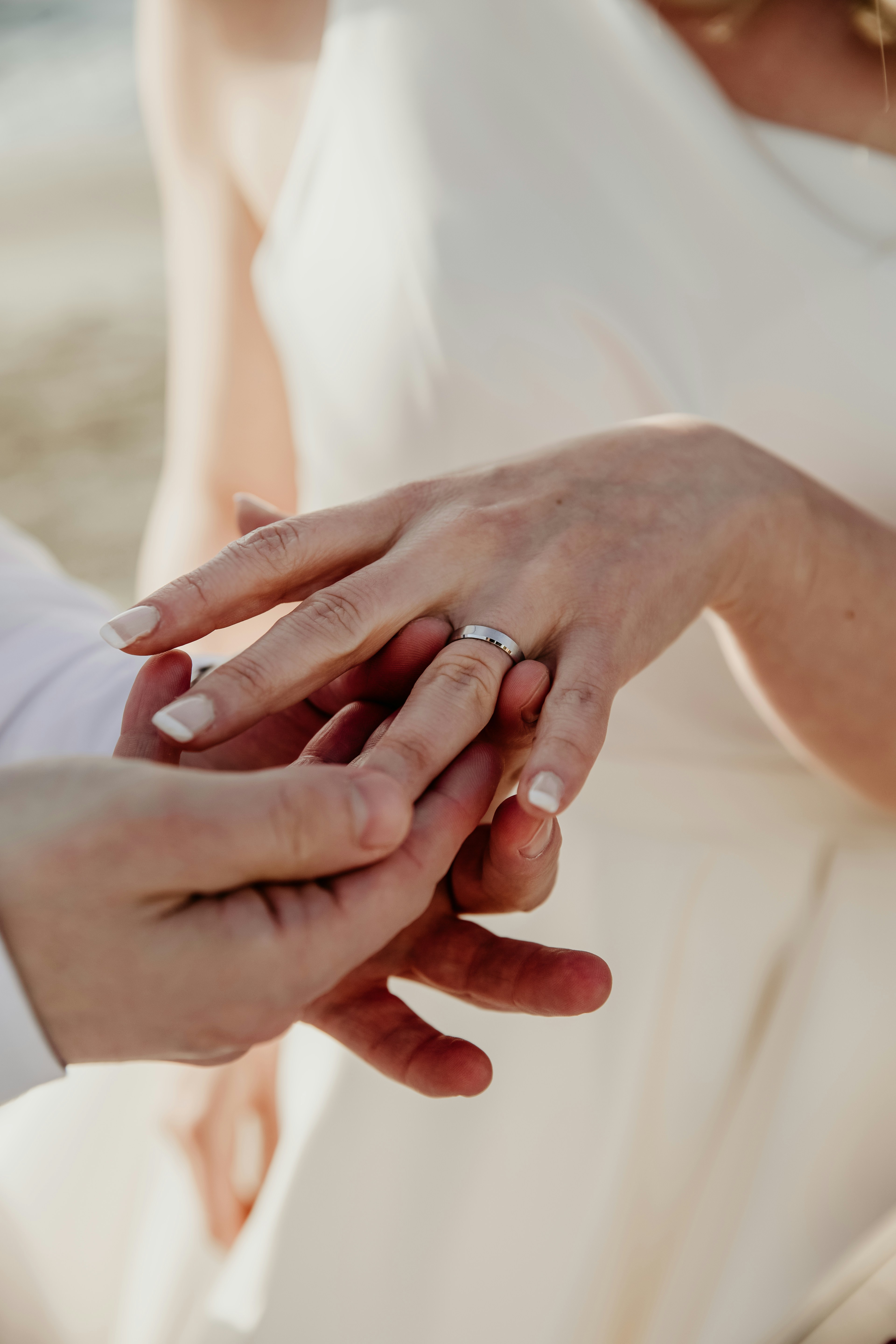 A close up of two people holding hands photo – Free Finger Image on ...