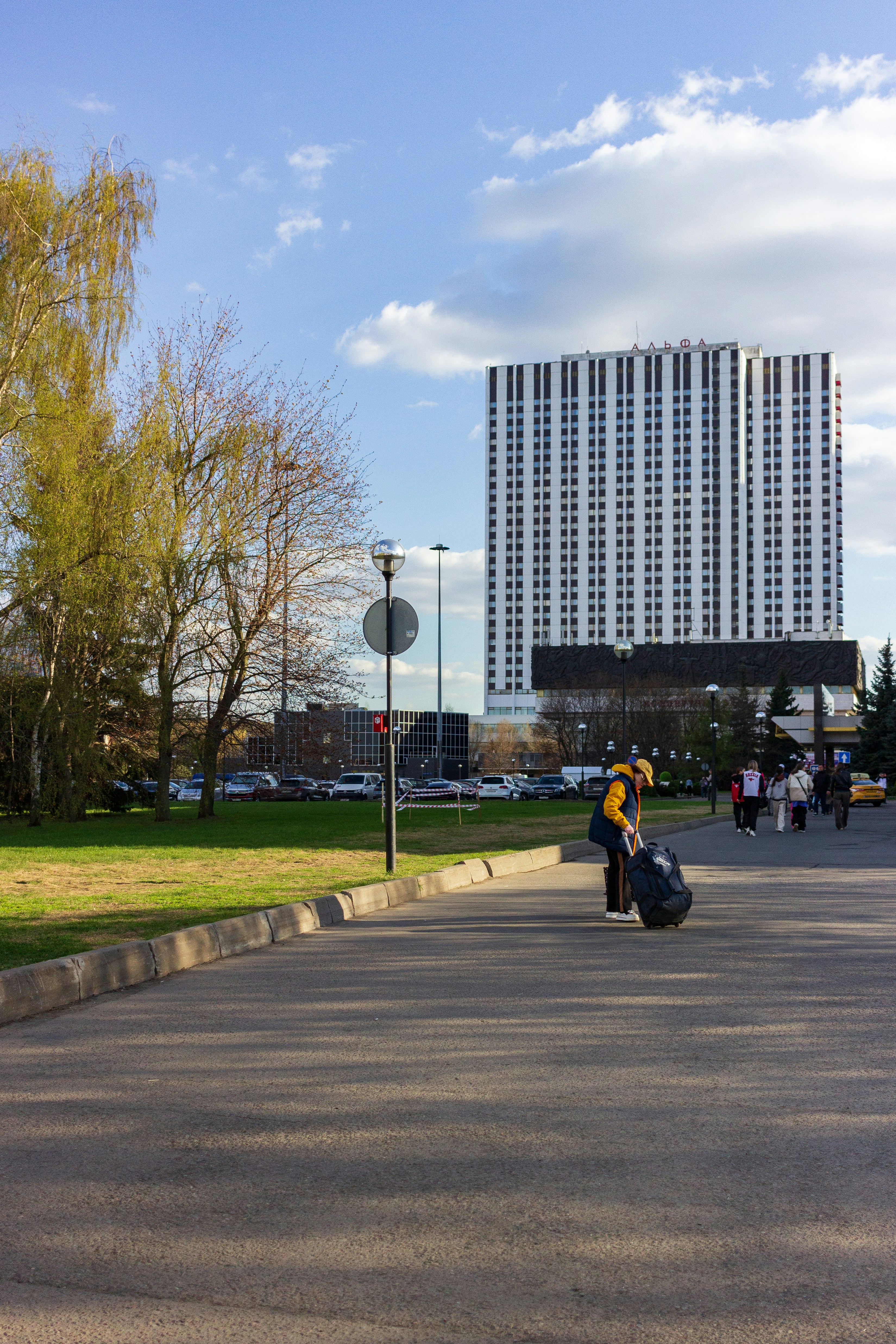 Rolling Toward a Skyline: A Traveler and the City Promenade